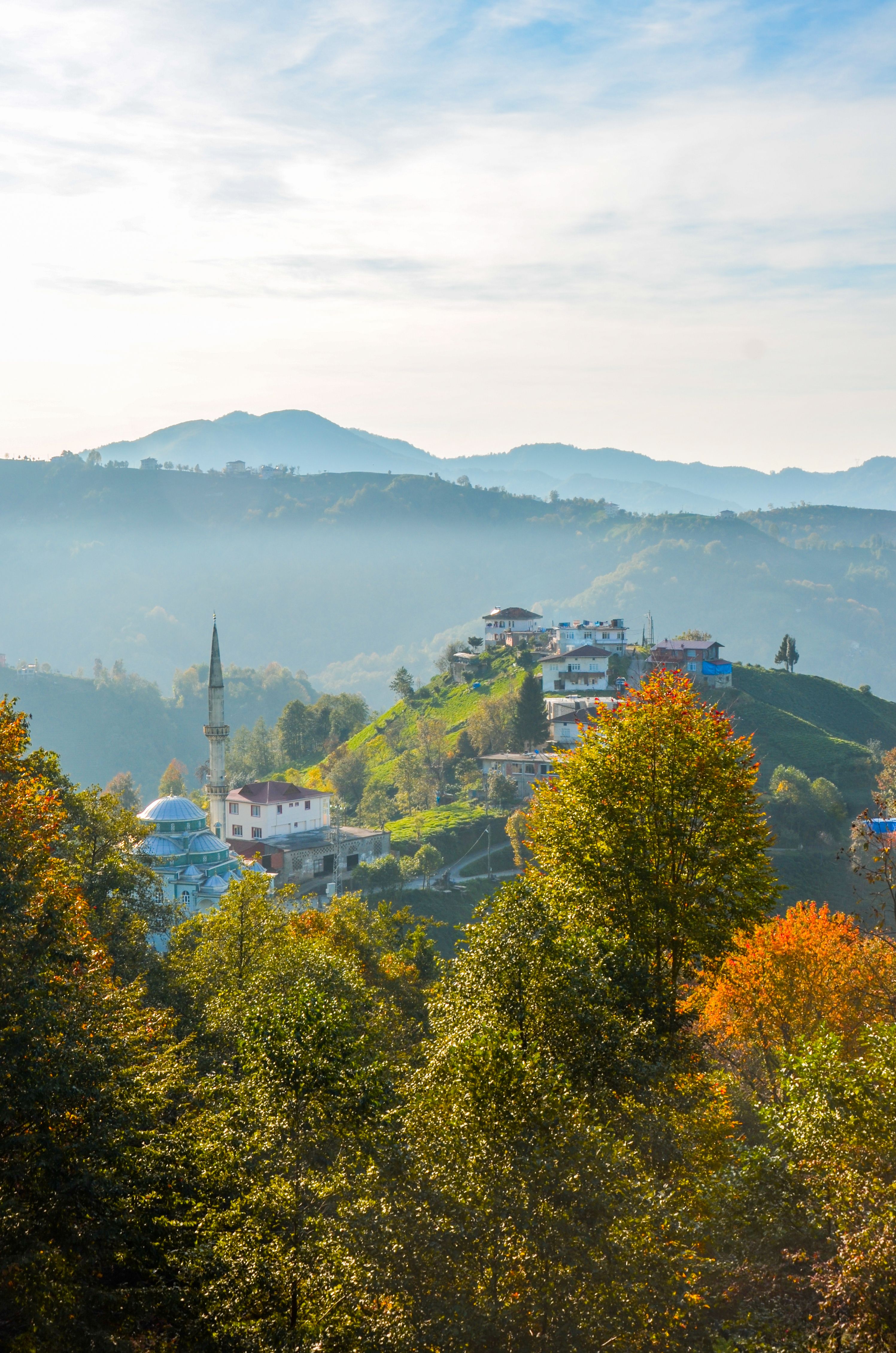 Town on the Hill and Mountains · Free Stock Photo