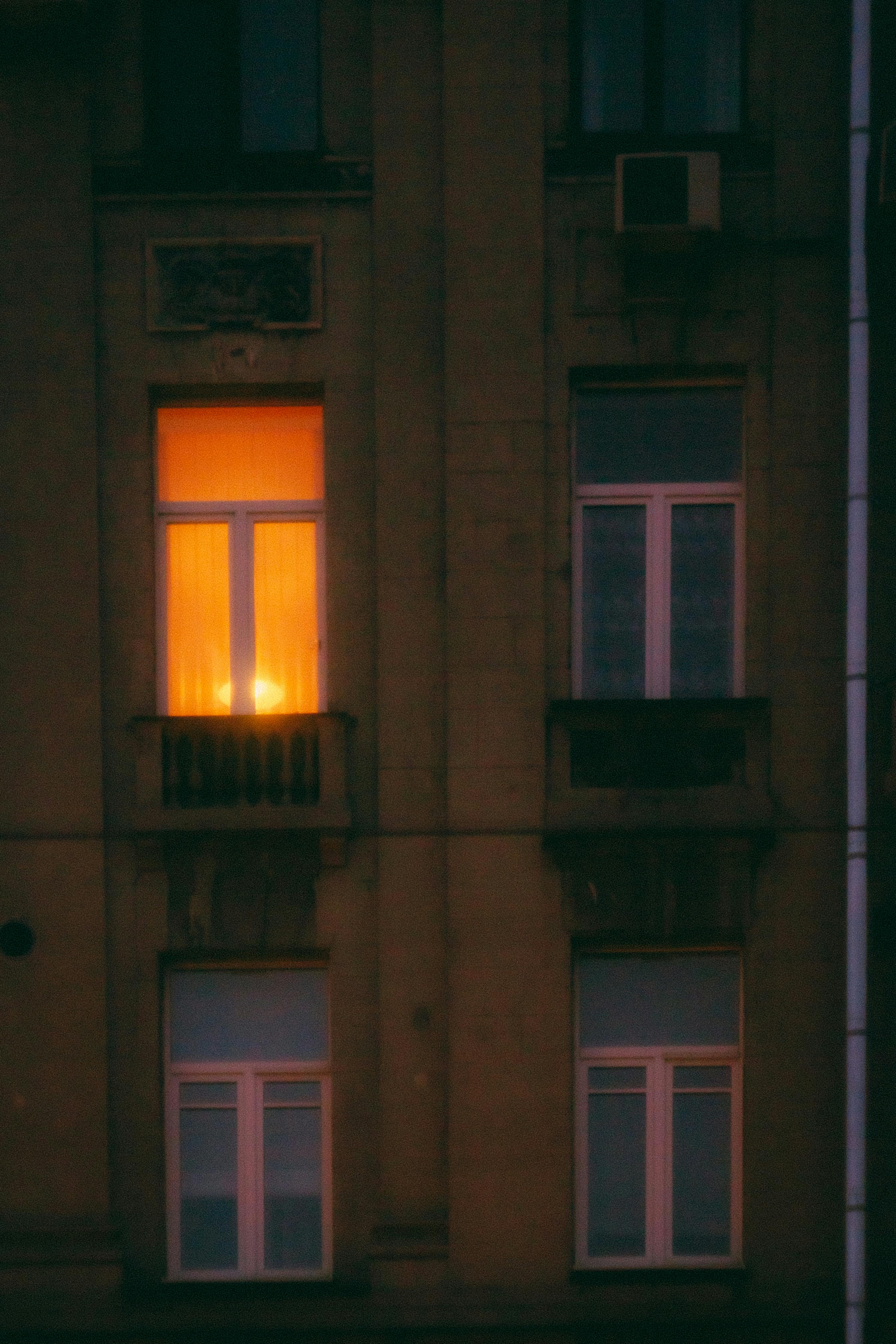 Light in Window on Tenement · Free Stock Photo