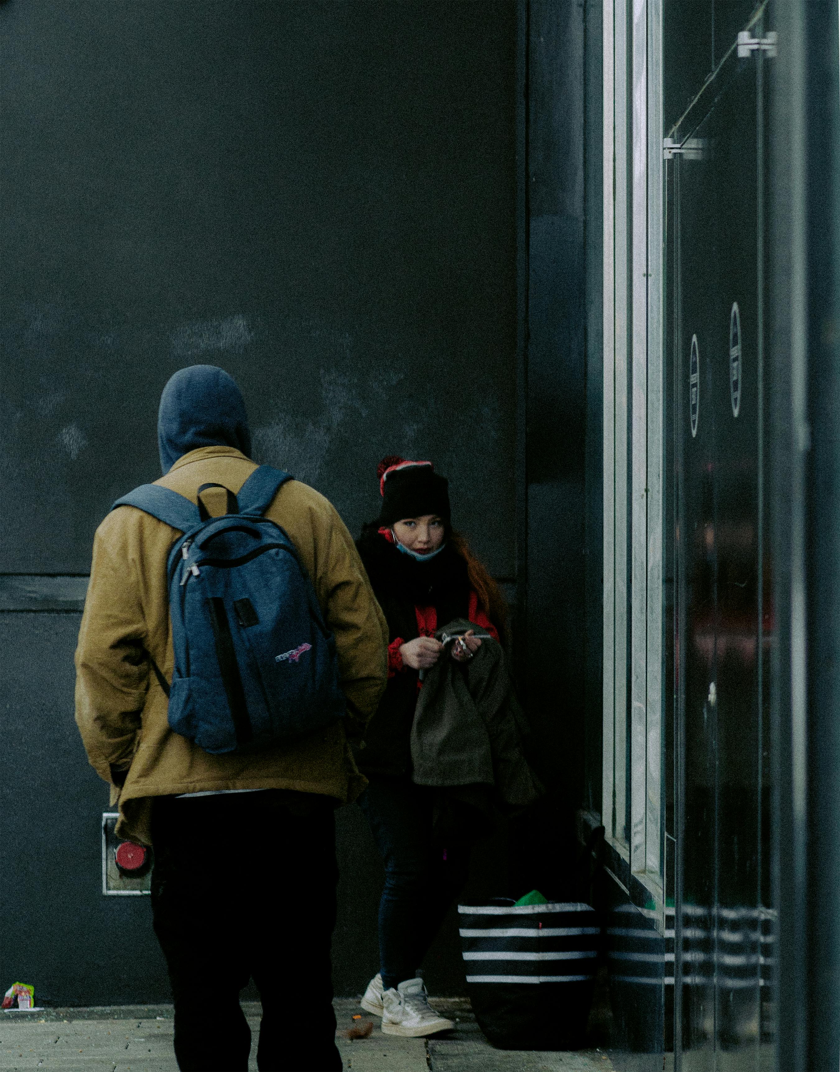 Teenage Couple Wearing School Uniforms Sitting on Steps · Free Stock Photo