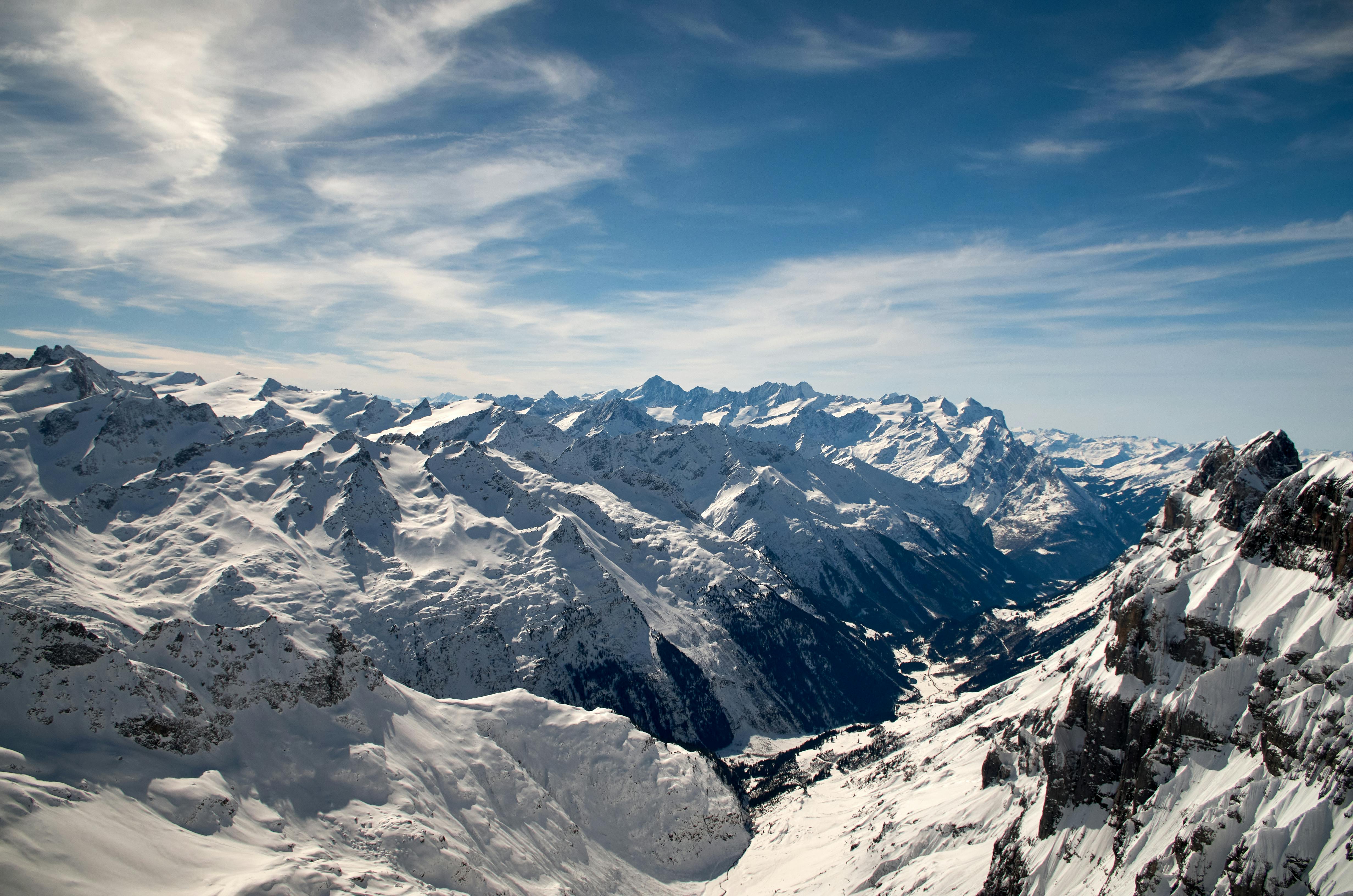 Mountain ranges Covered in Snow · Free Stock Photo