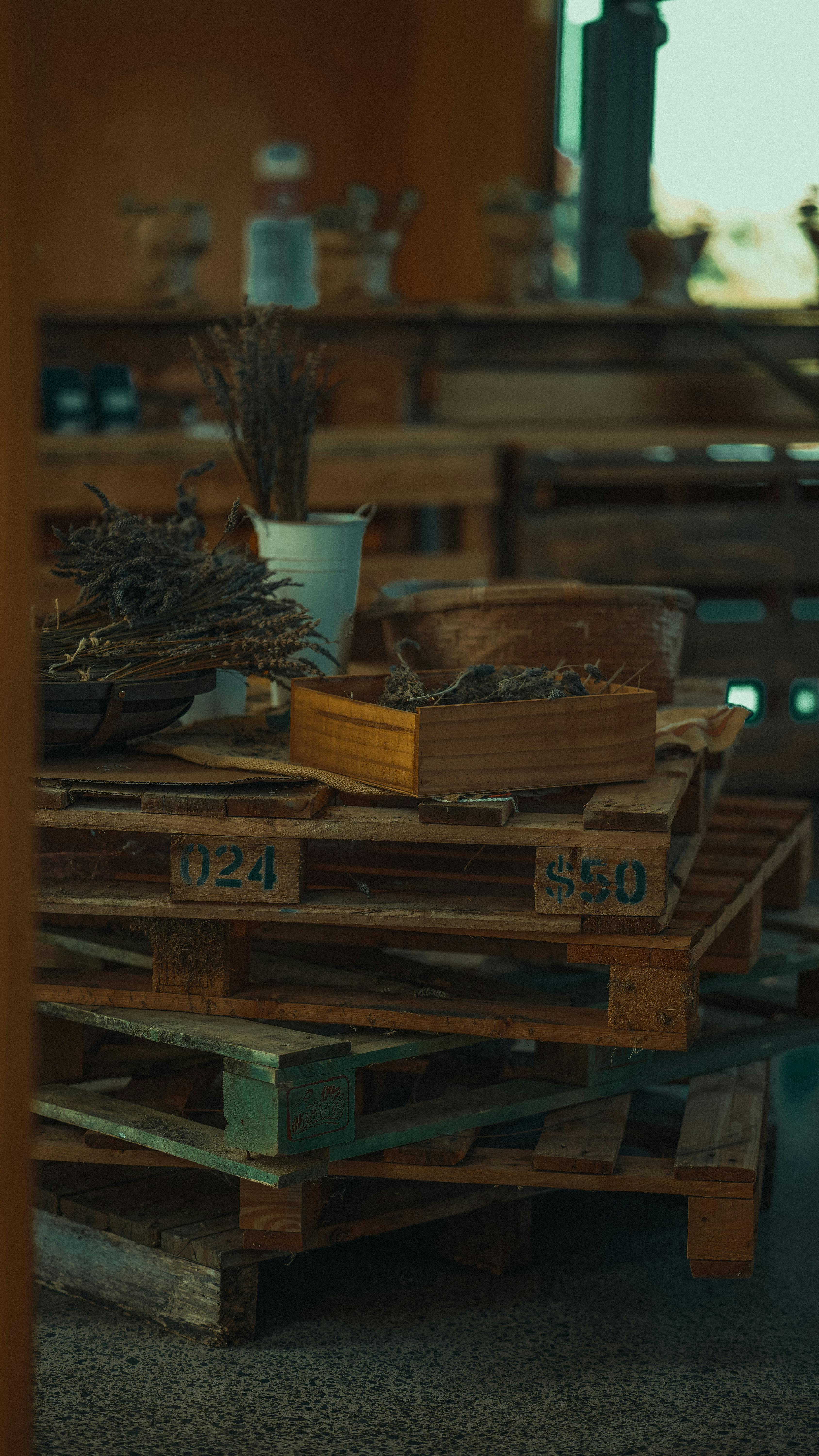 Herbs Drying on a Stack of Pallets · Free Stock Photo