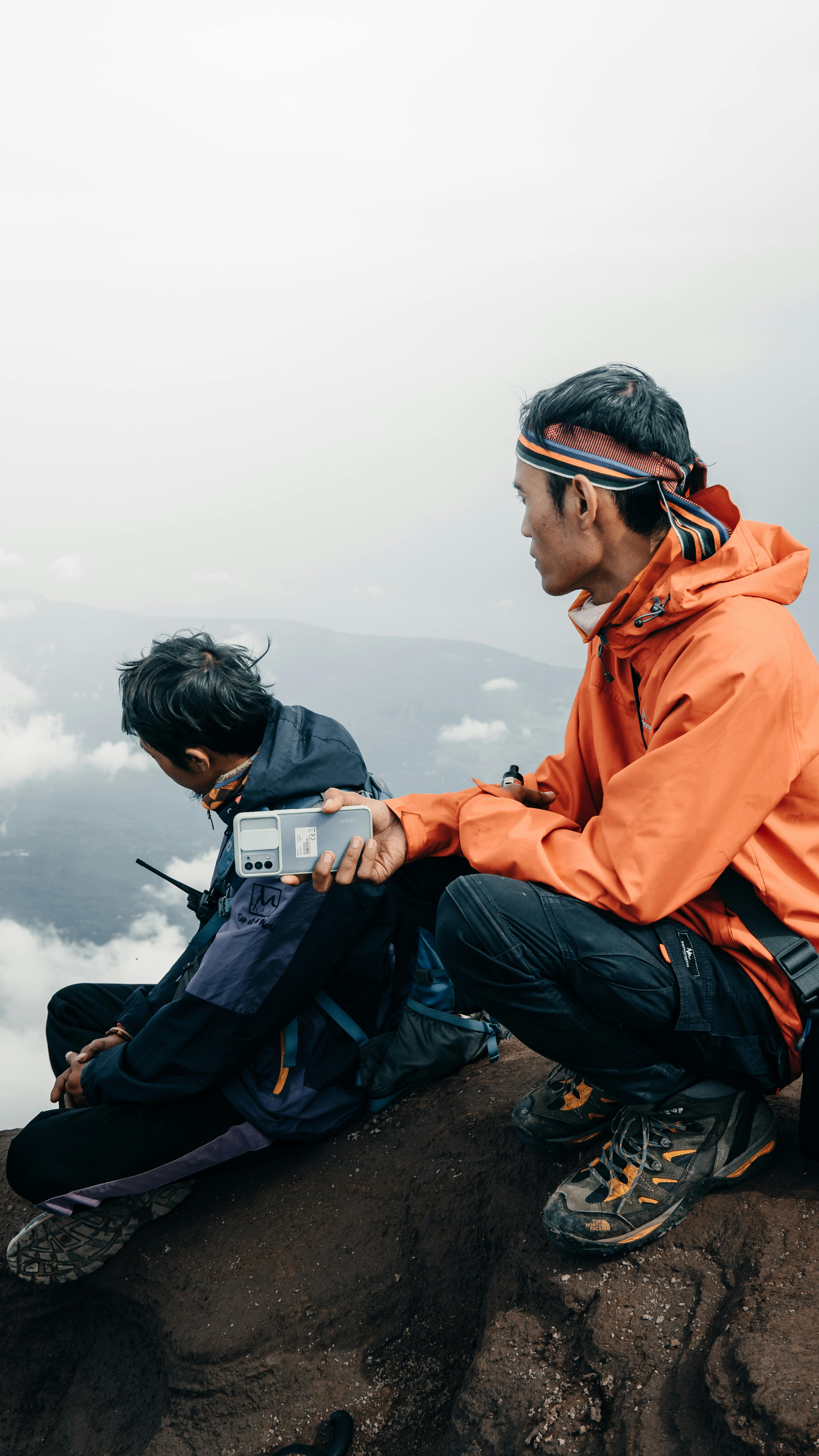 Man Carrying Heavy Load in Mountains · Free Stock Photo