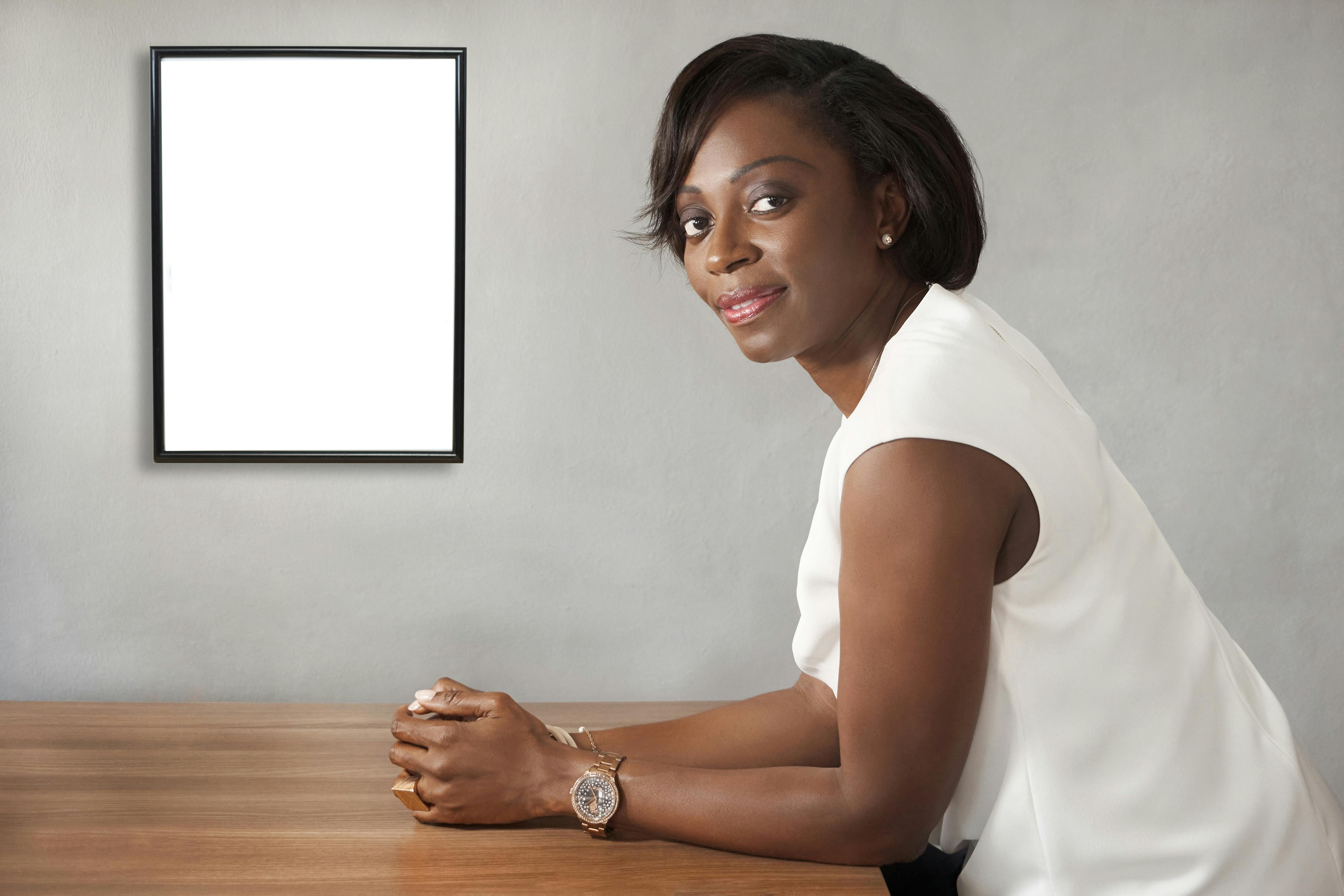 A Woman Leaning on Railing · Free Stock Photo