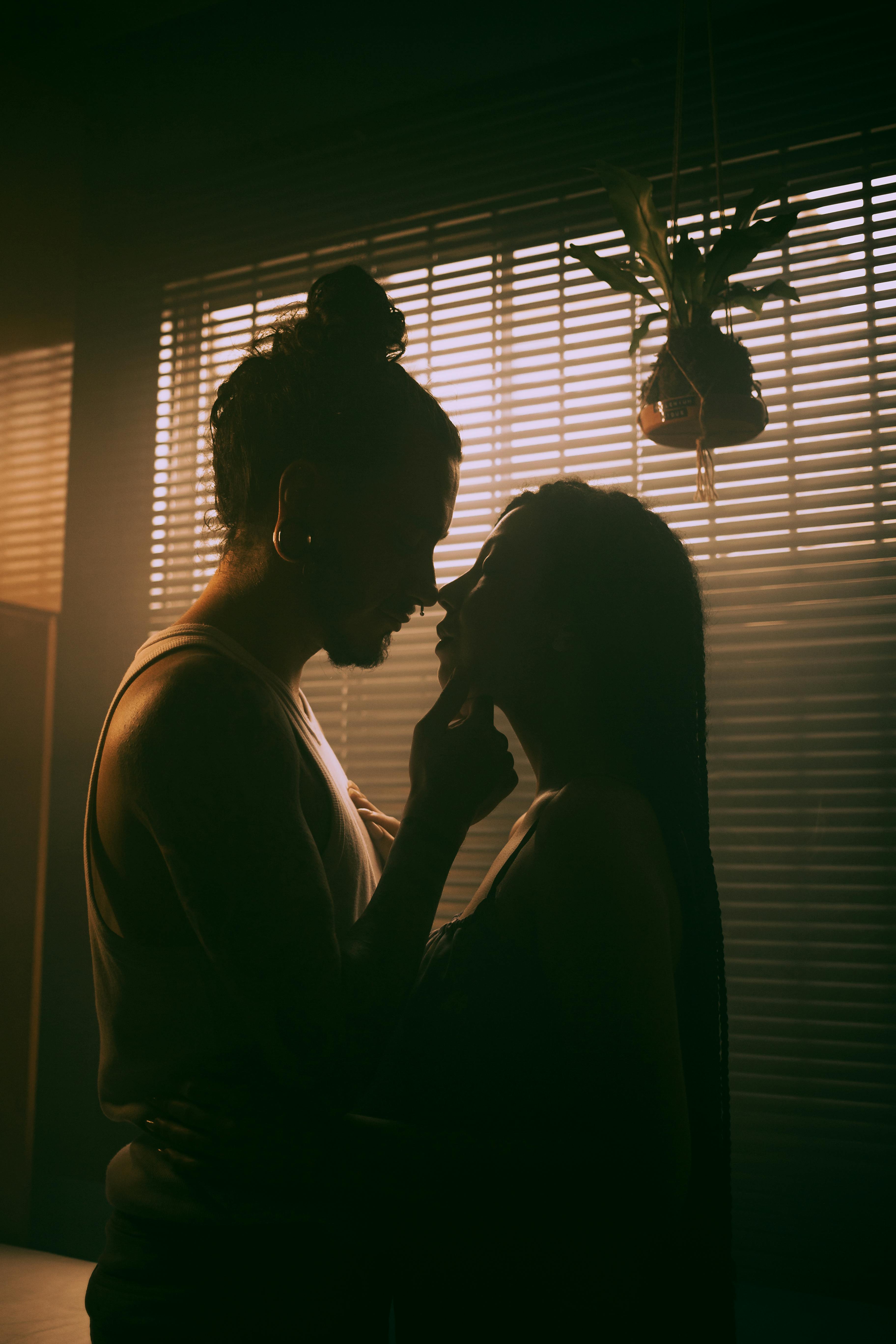 Young Couple Embracing · Free Stock Photo