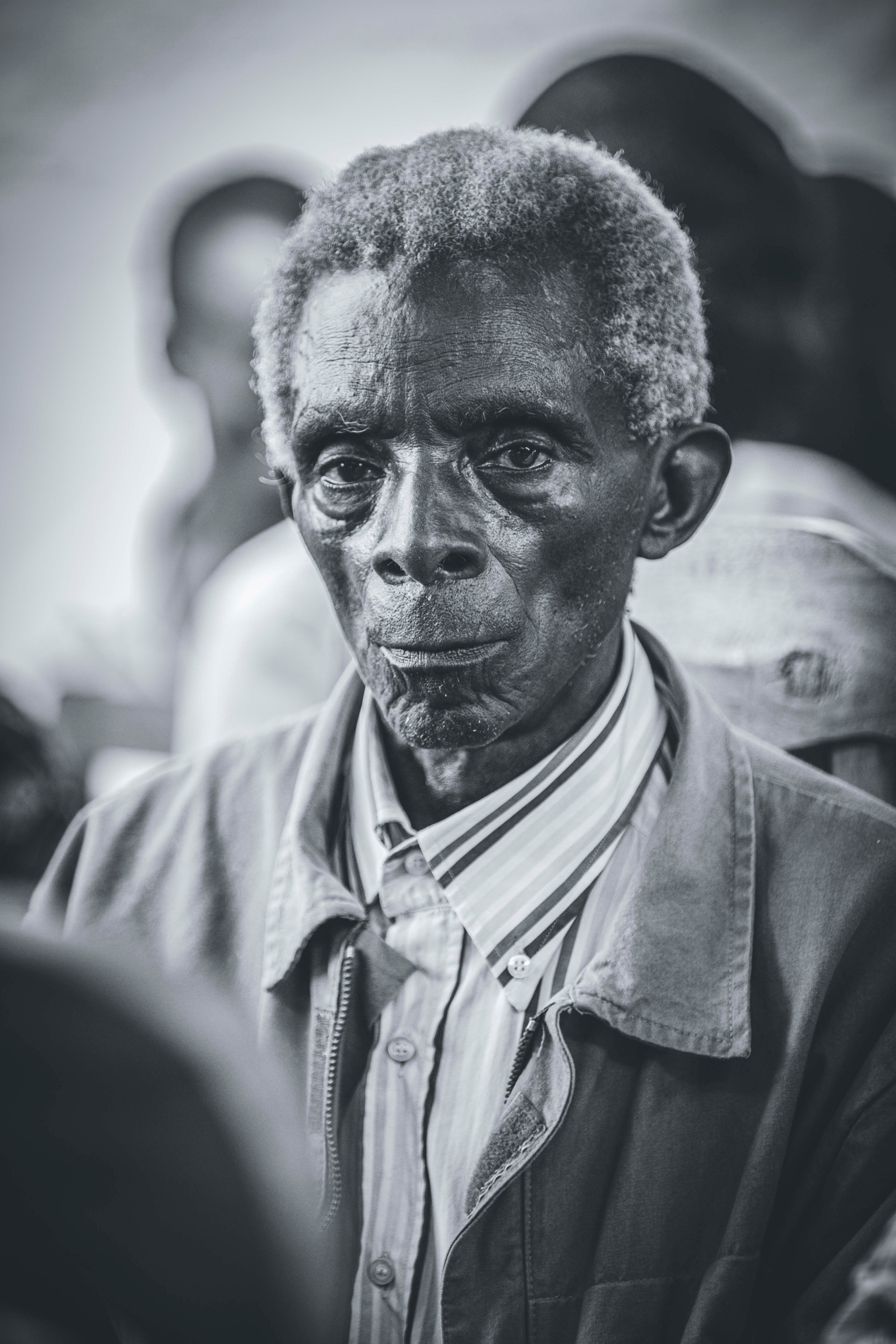 Elderly Man with Hat Holding String · Free Stock Photo