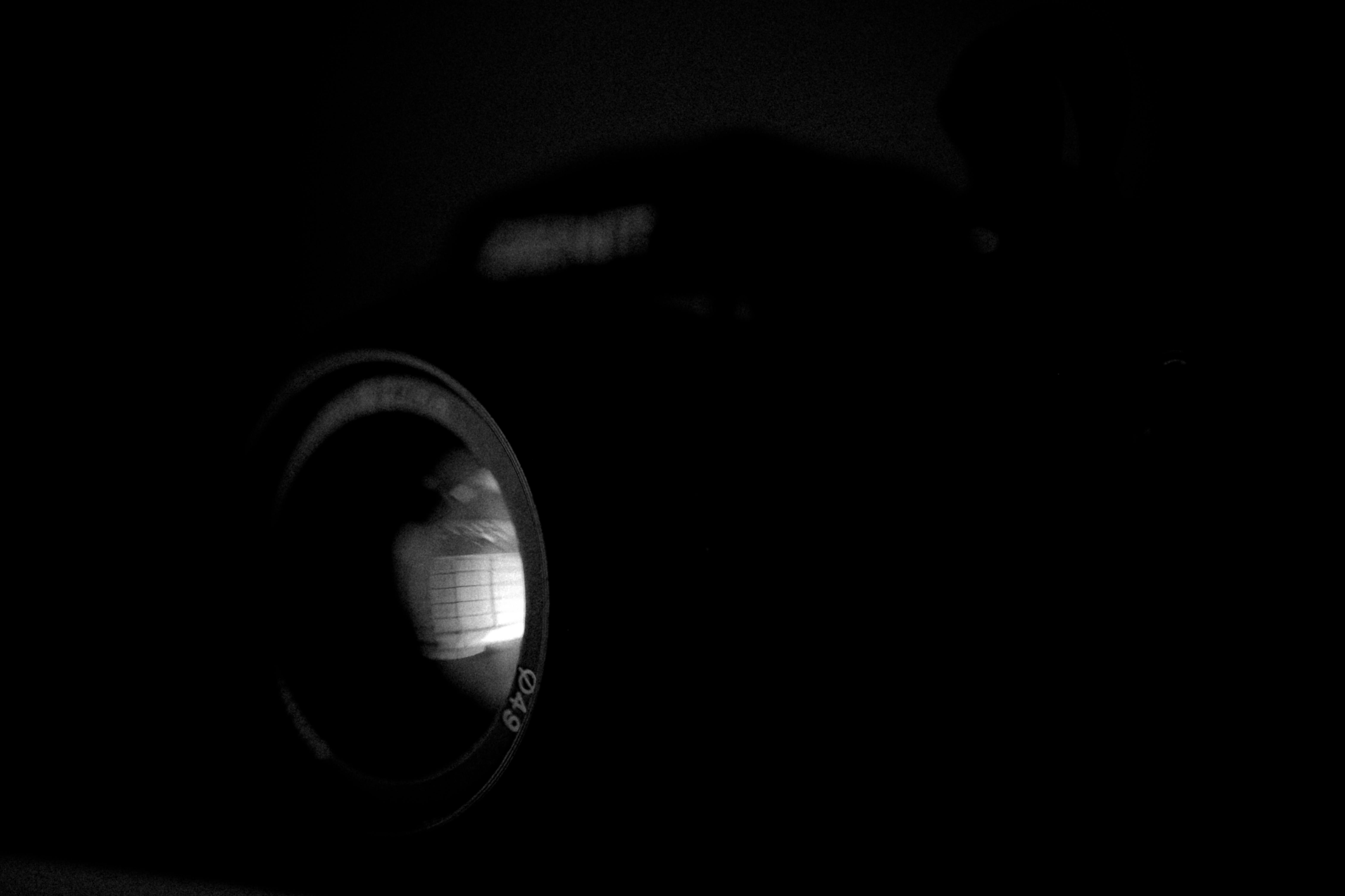 Grayscale Photograph of a Lens Cap · Free Stock Photo