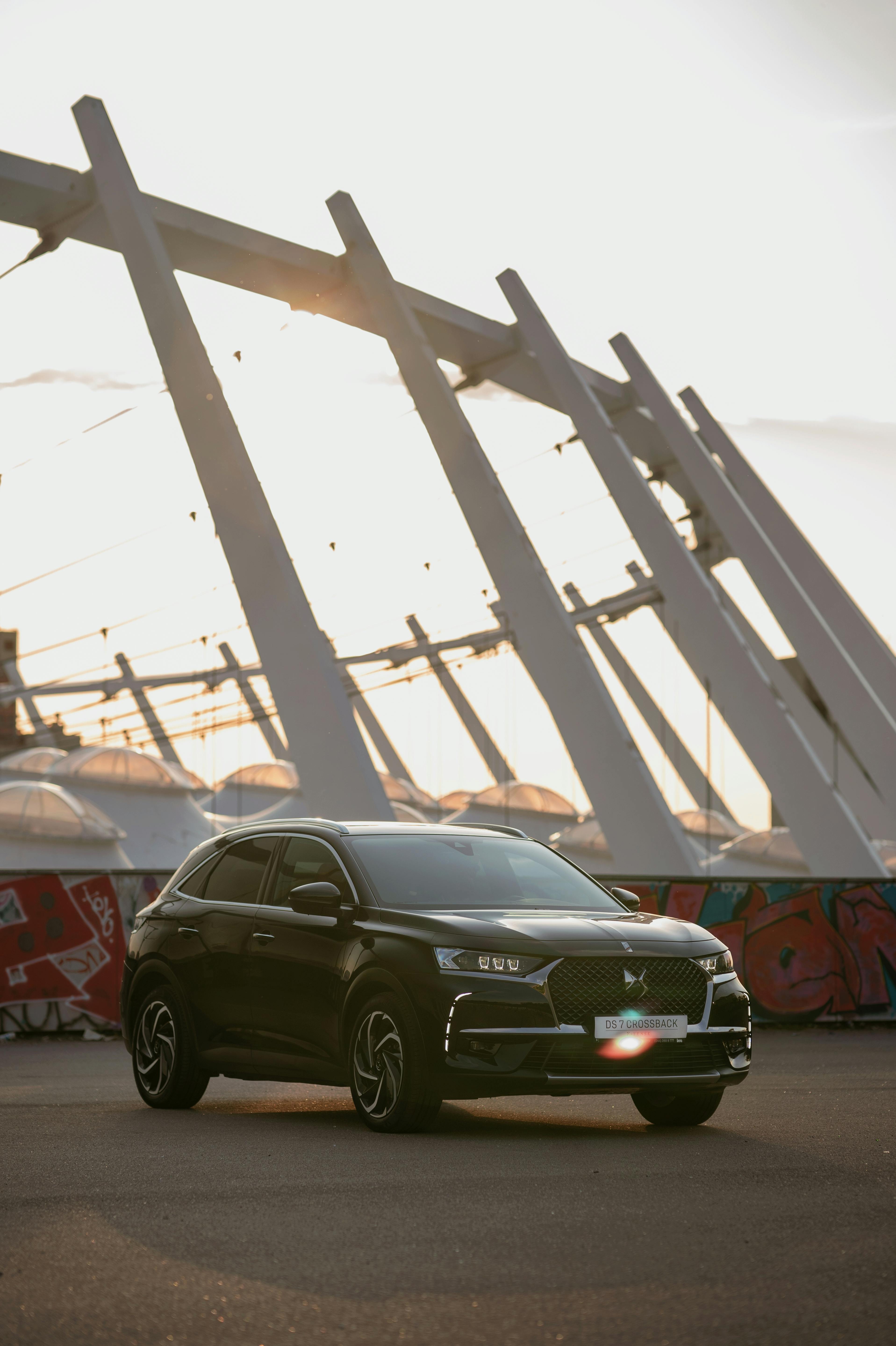 Modern Car on Bridge on Sunset · Free Stock Photo