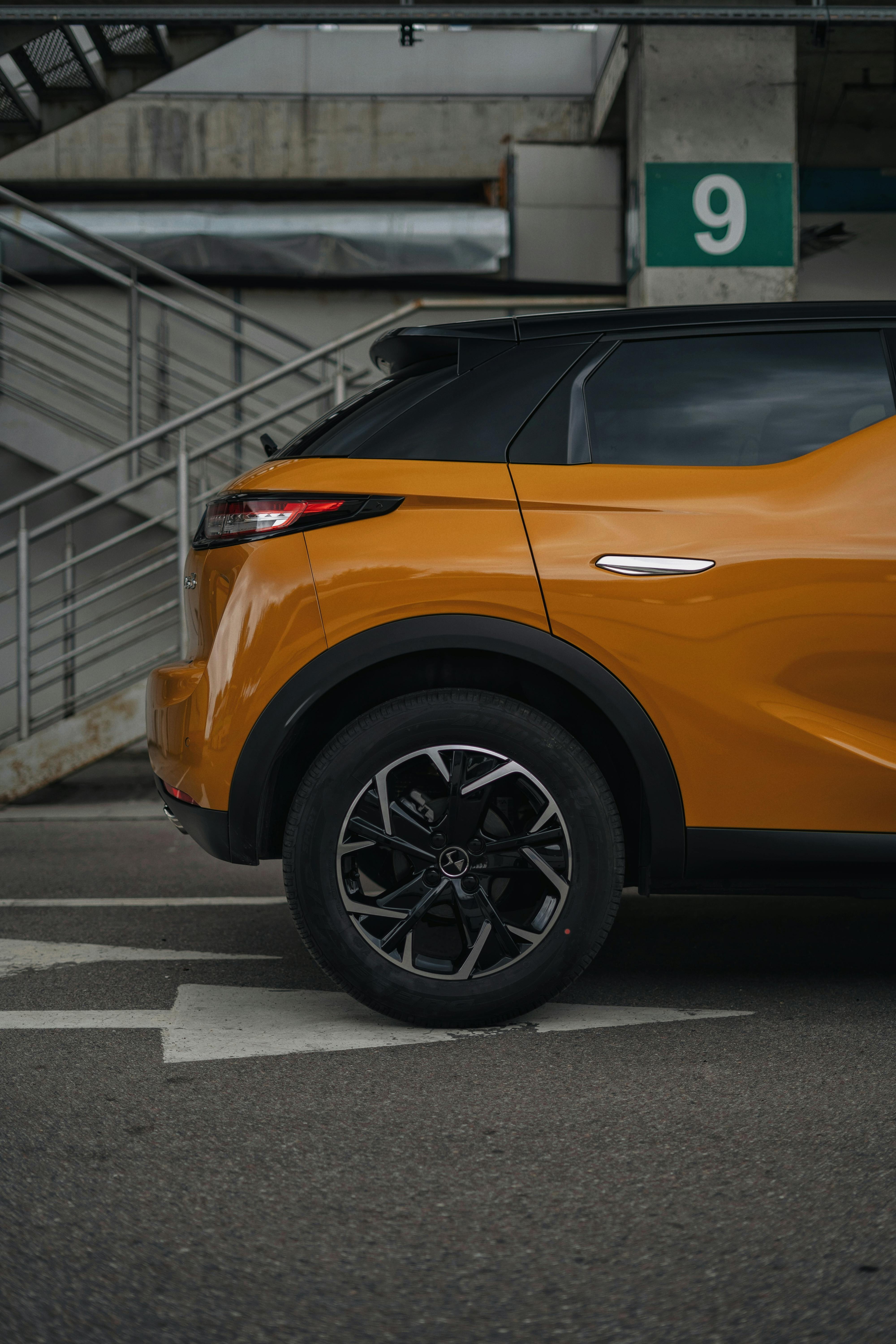 Rear of Orange Car · Free Stock Photo