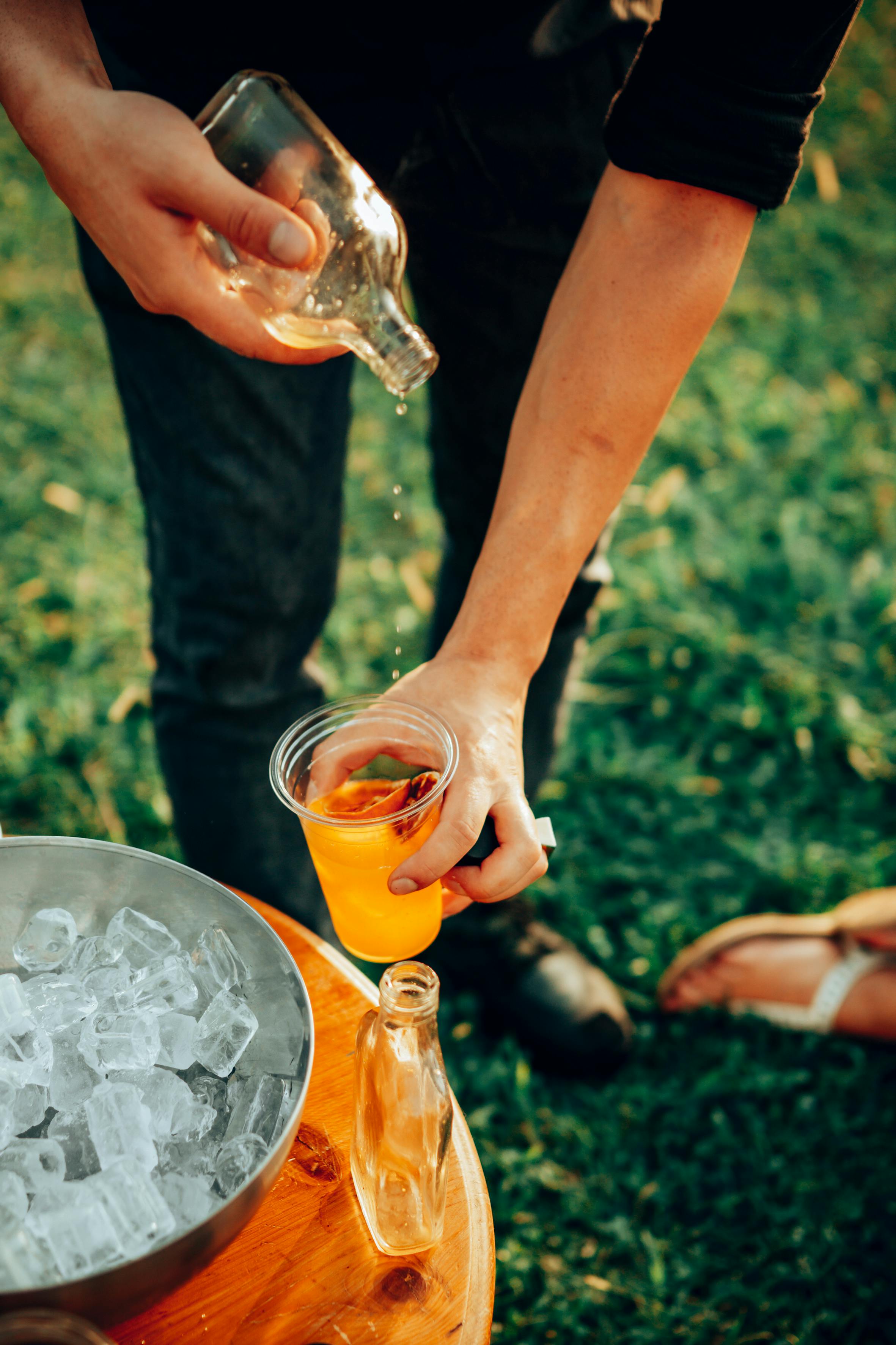 Man Pouring Alcohol · Free Stock Photo