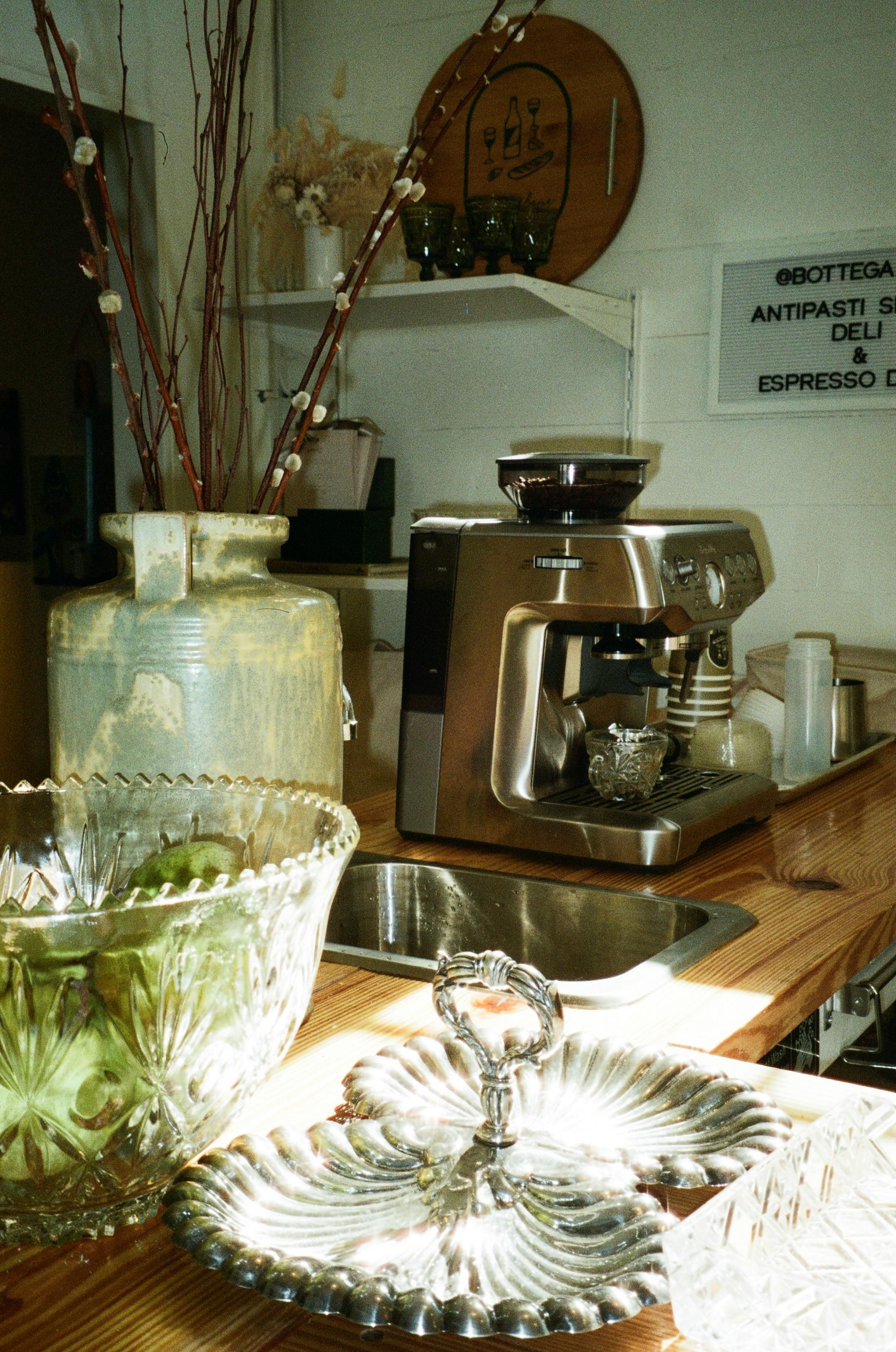 Kitchen Countertop with Decorations and an Espresso Machine · Free ...