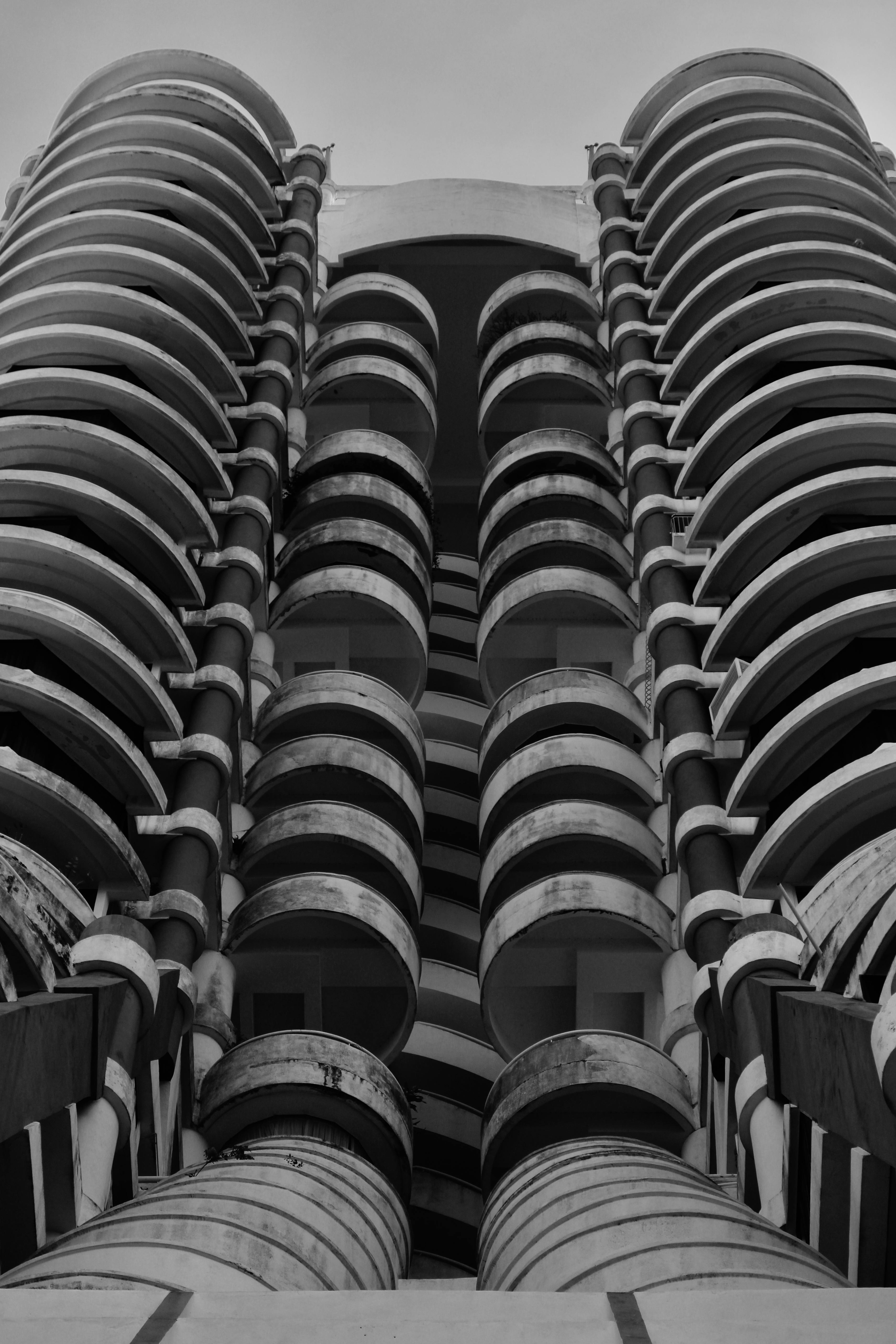 Building with Circular Tower Covered in Tiles · Free Stock Photo