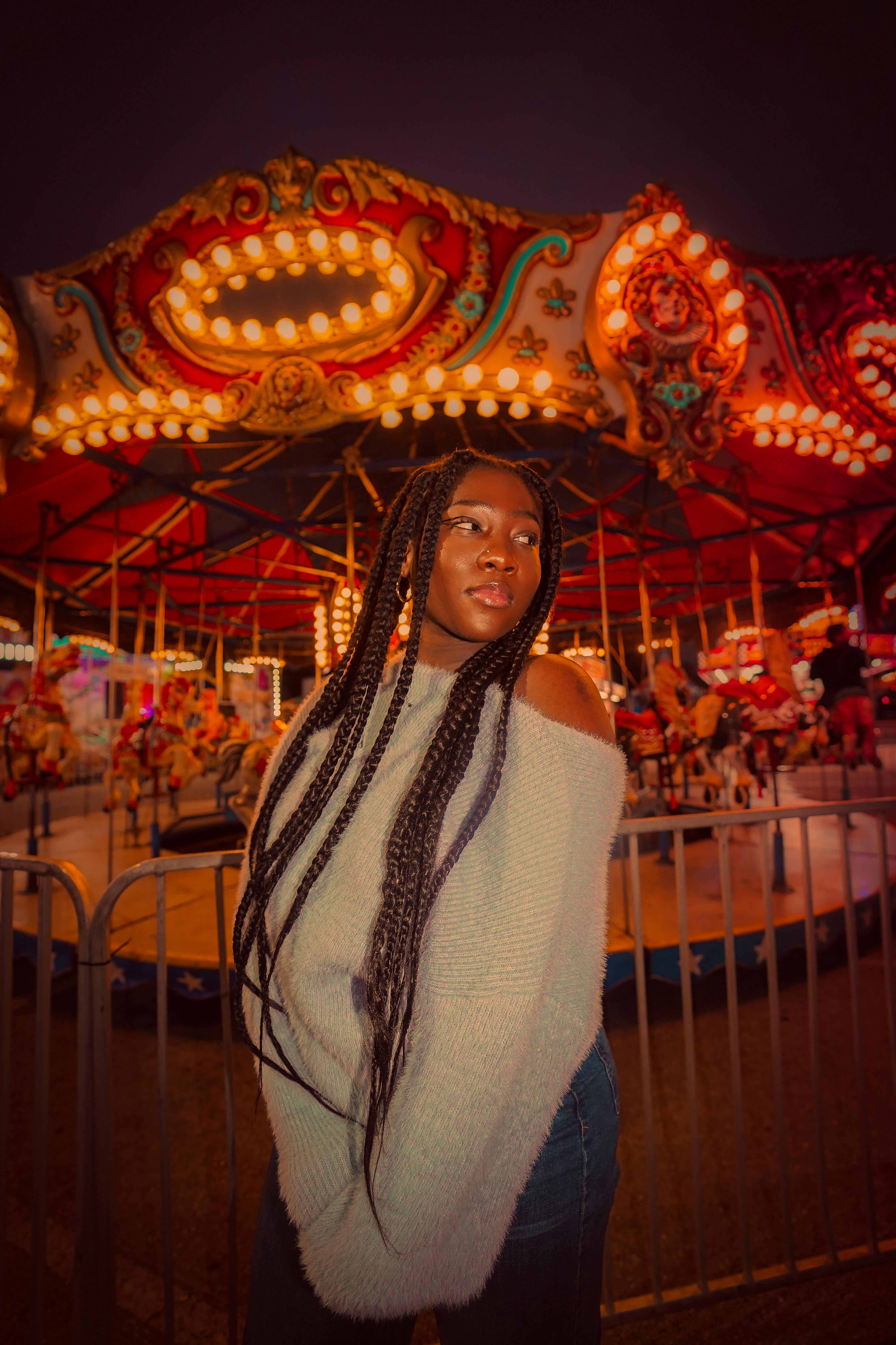 Girl Standing Near Carousel · Free Stock Photo