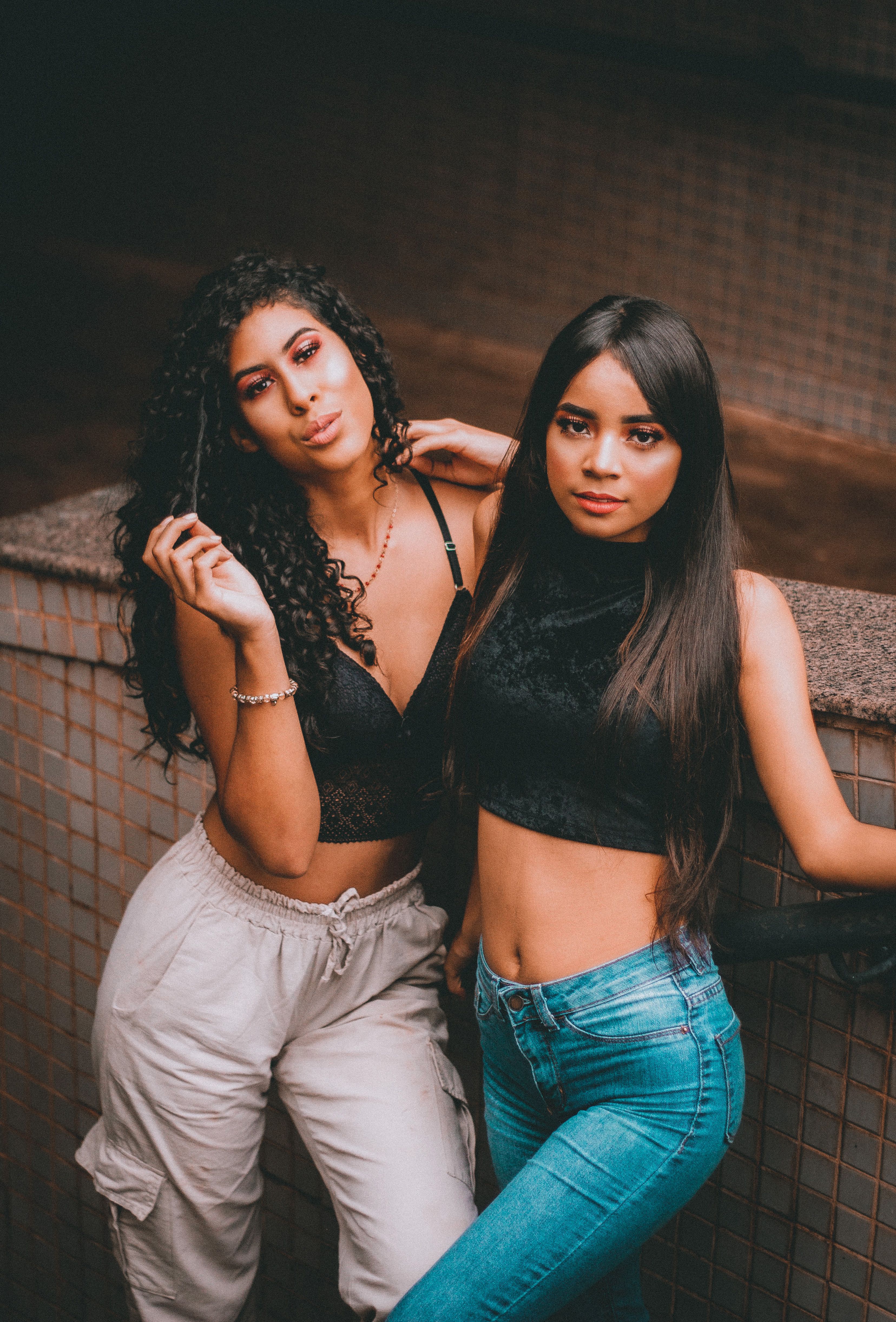 Photo of Two Women Wearing Black Tops · Free Stock Photo