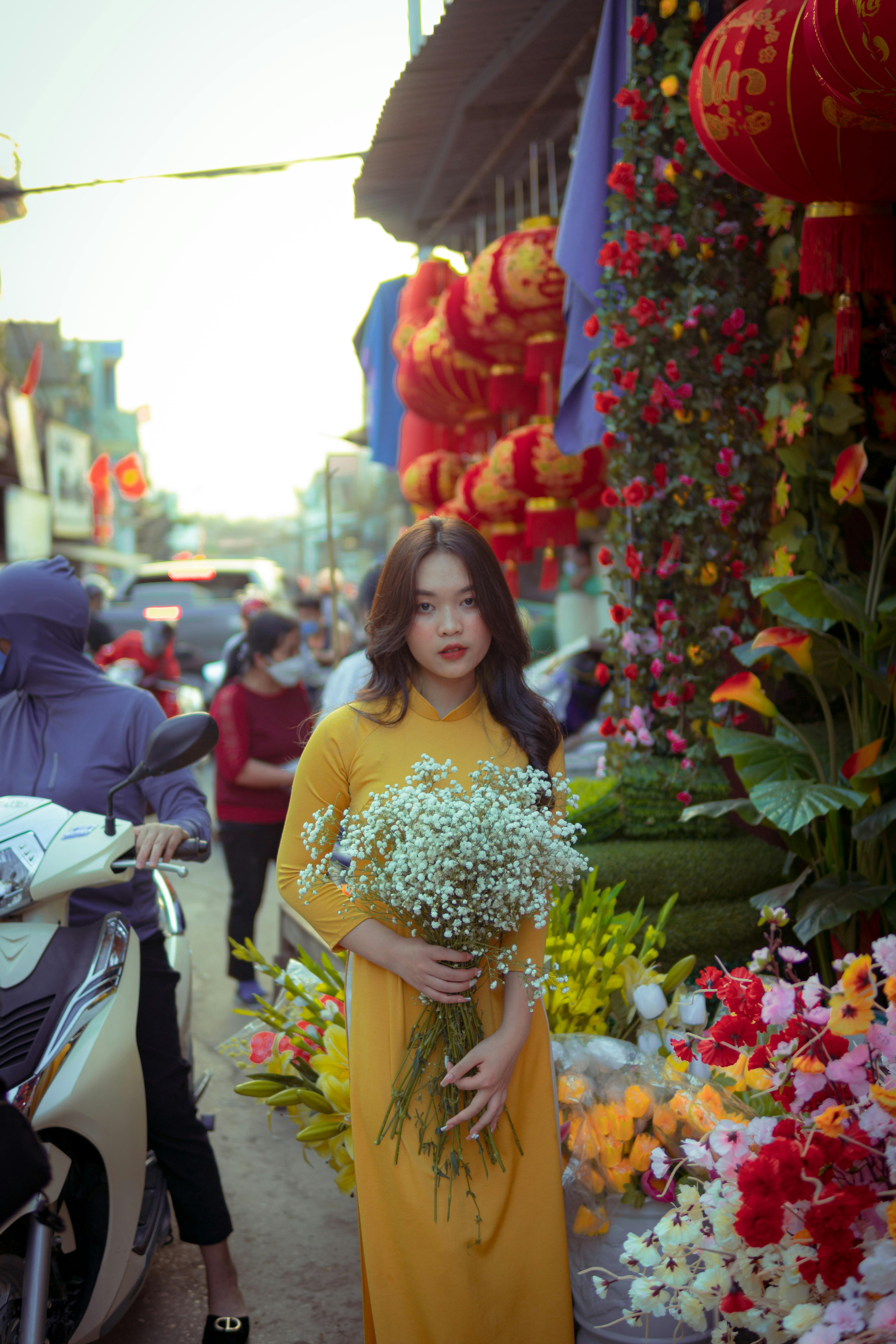 Person Hiding Face With Flowers · Free Stock Photo