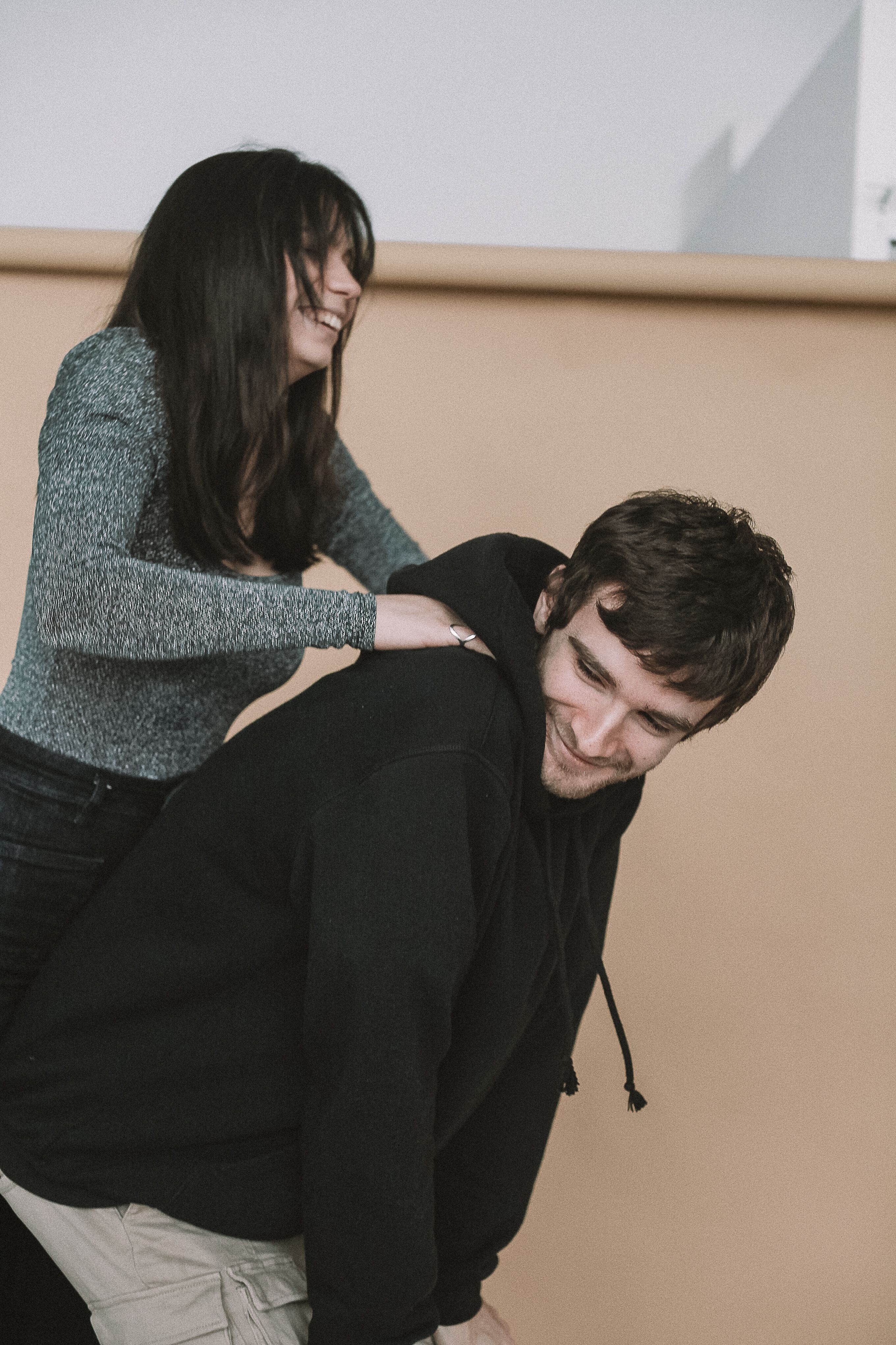 Man Giving a Woman Piggy Back Ride · Free Stock Photo