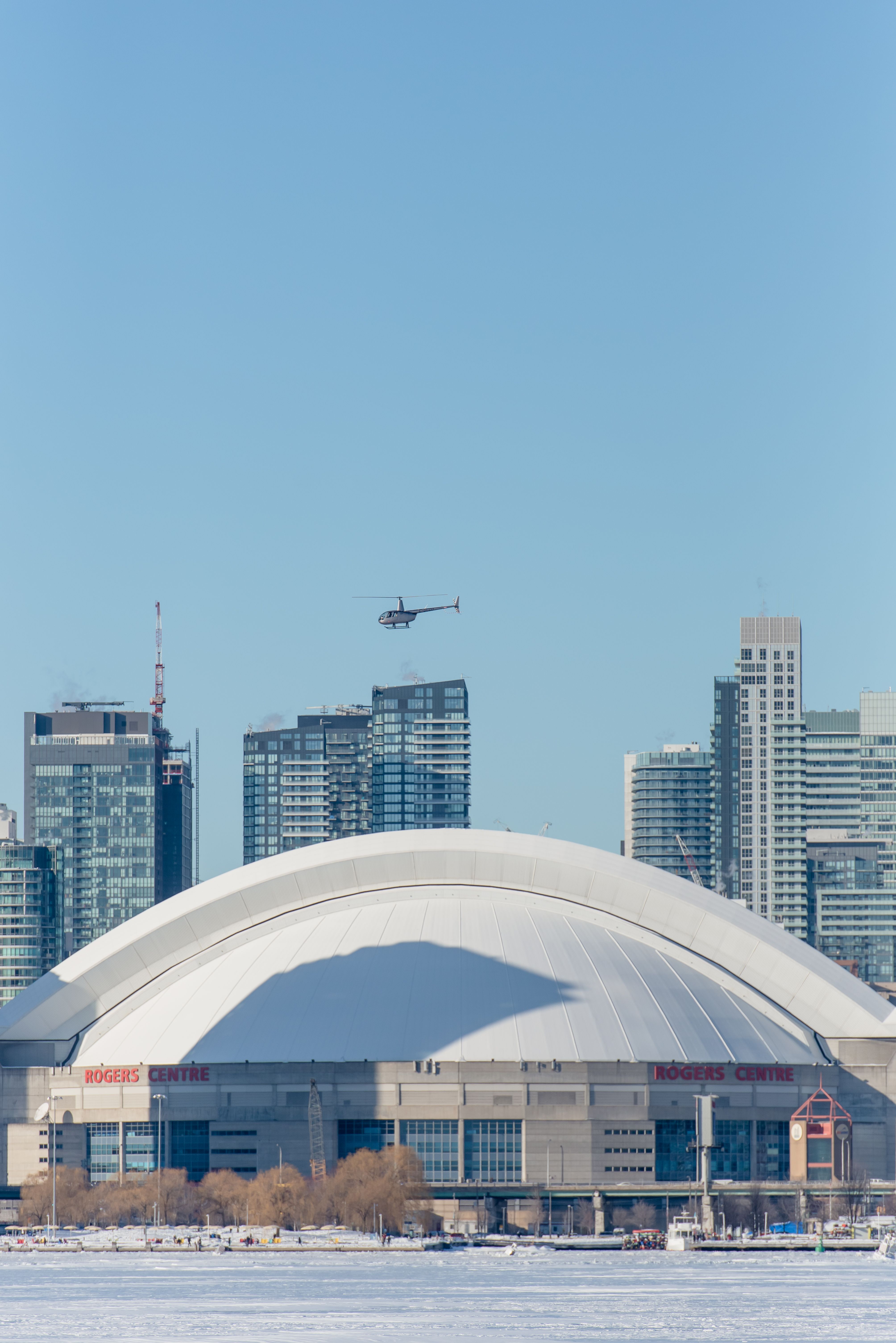 Helicopter Flying over a Shopping Center · Free Stock Photo