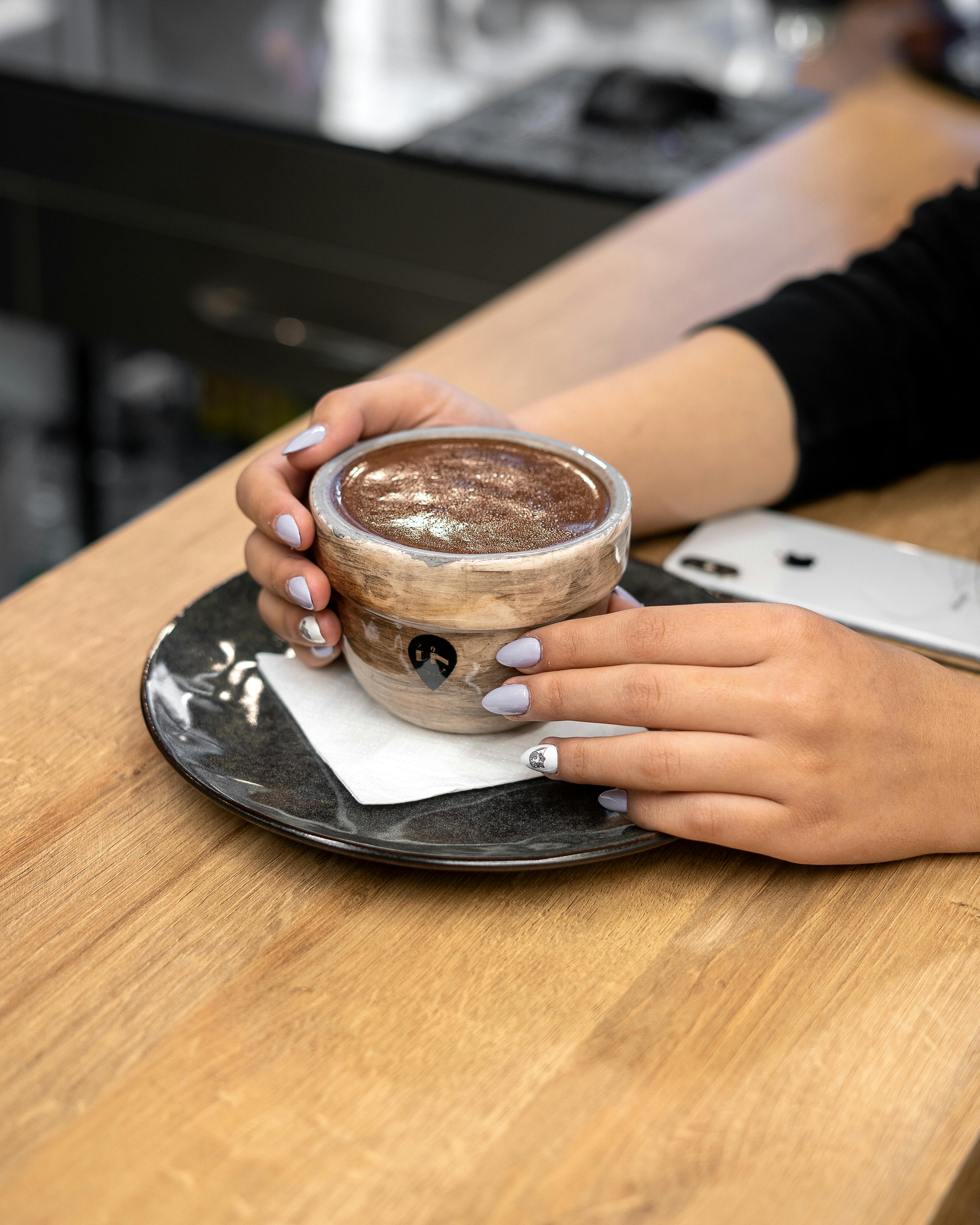 White Ceramic Bowl on Brown Wooden Table · Free Stock Photo