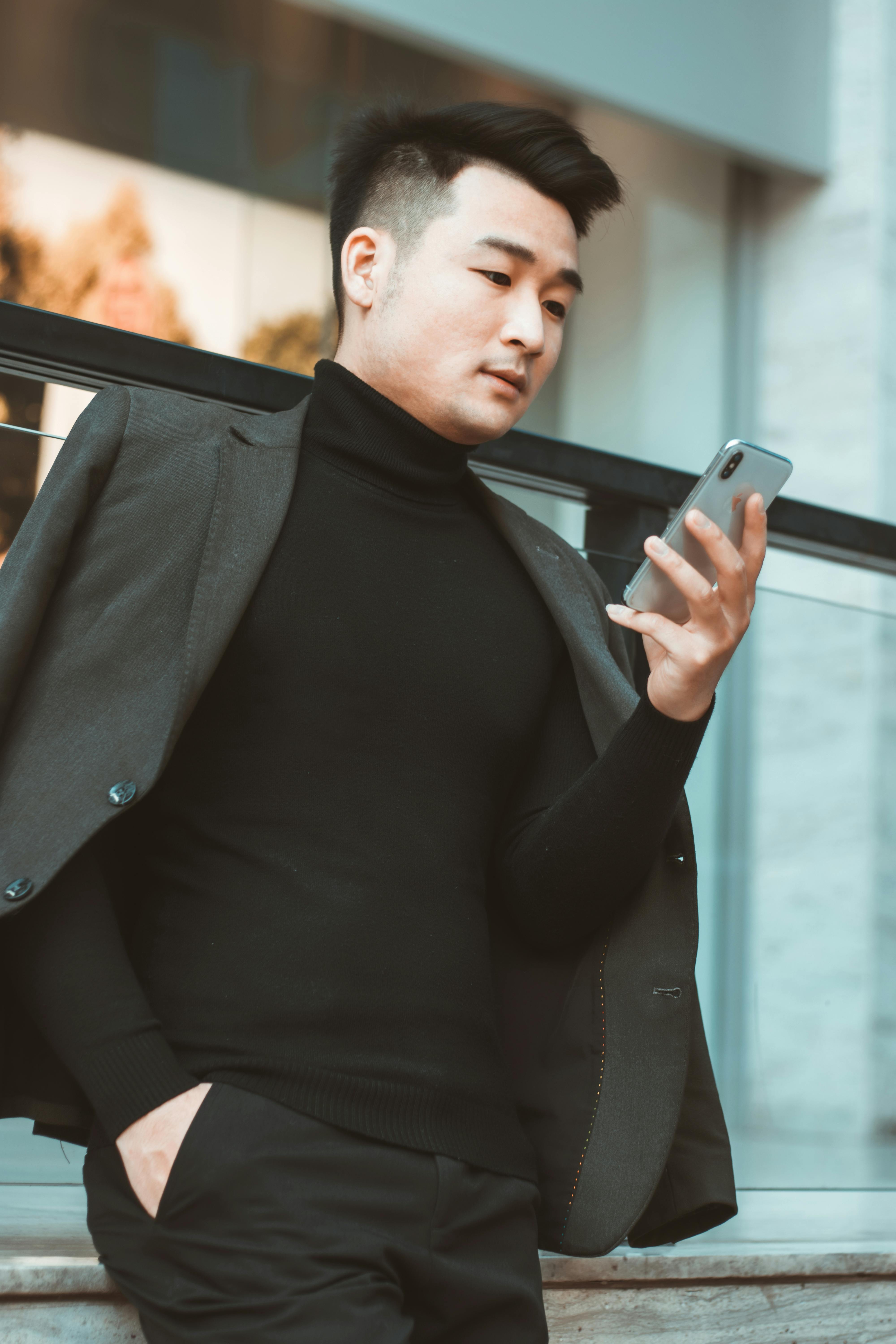 Man Checking His Phone · Free Stock Photo