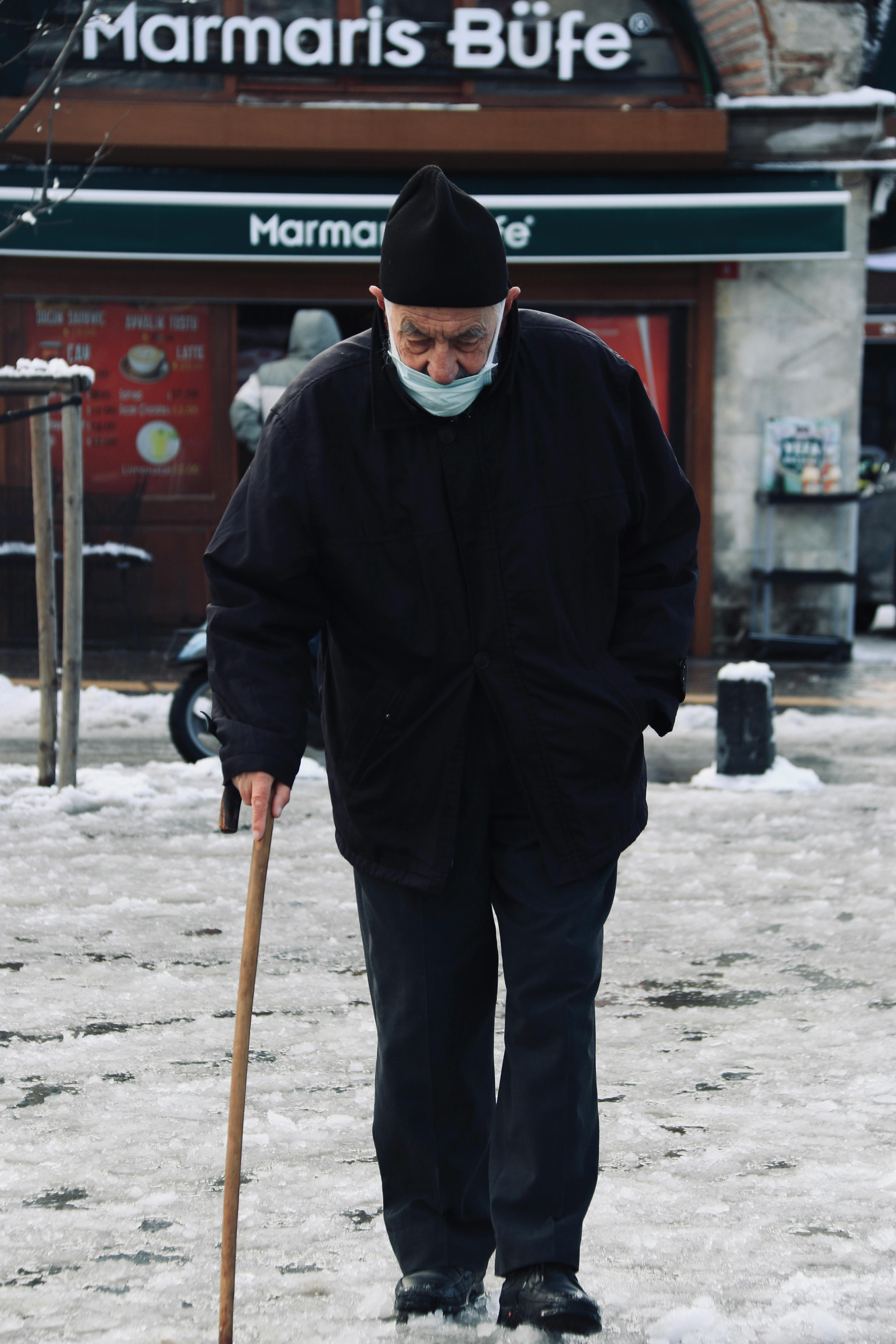 Elderly Men Walking at the Beach · Free Stock Photo
