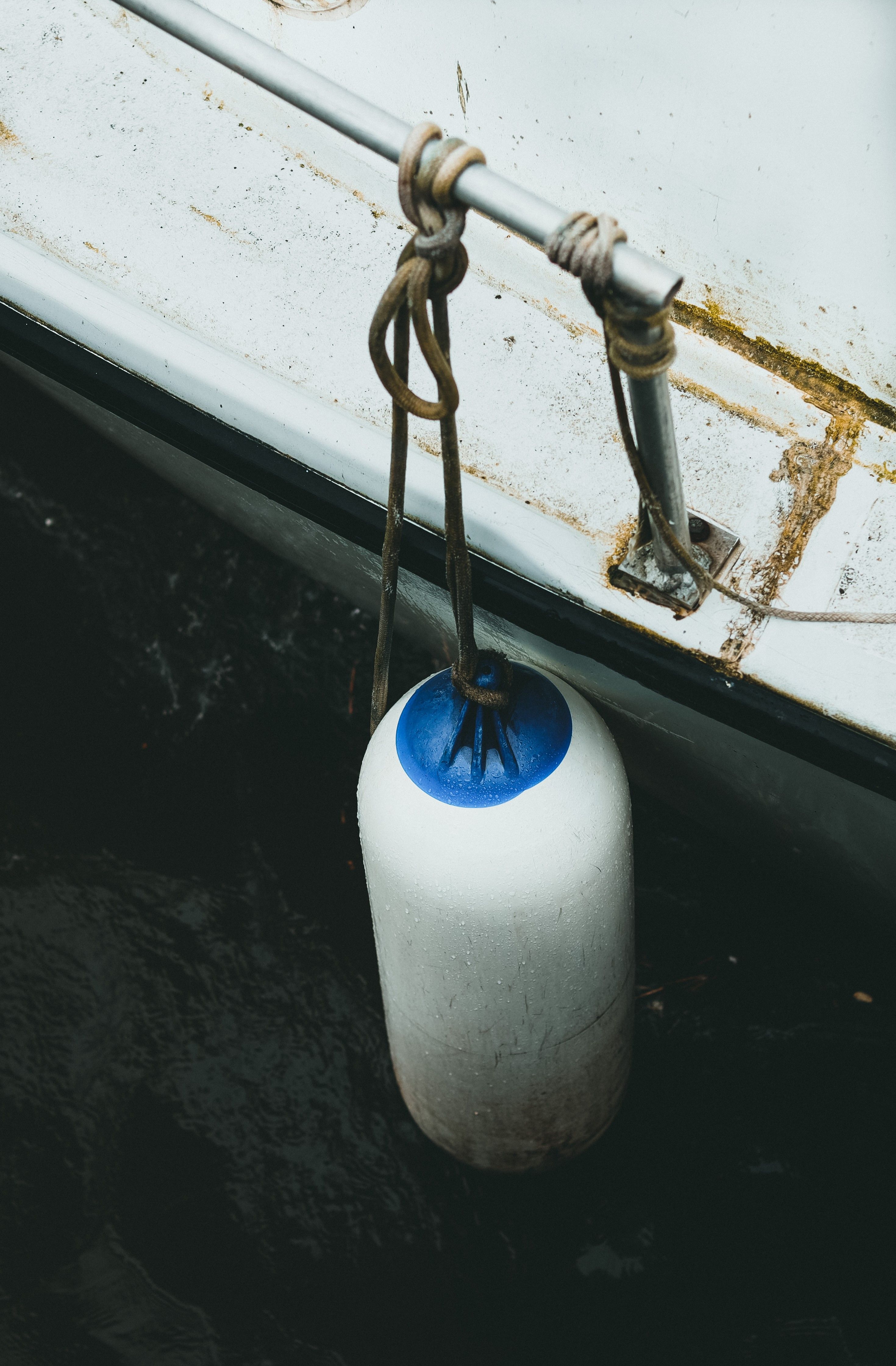 White Kettle Hanging on the Clothesline · Free Stock Photo