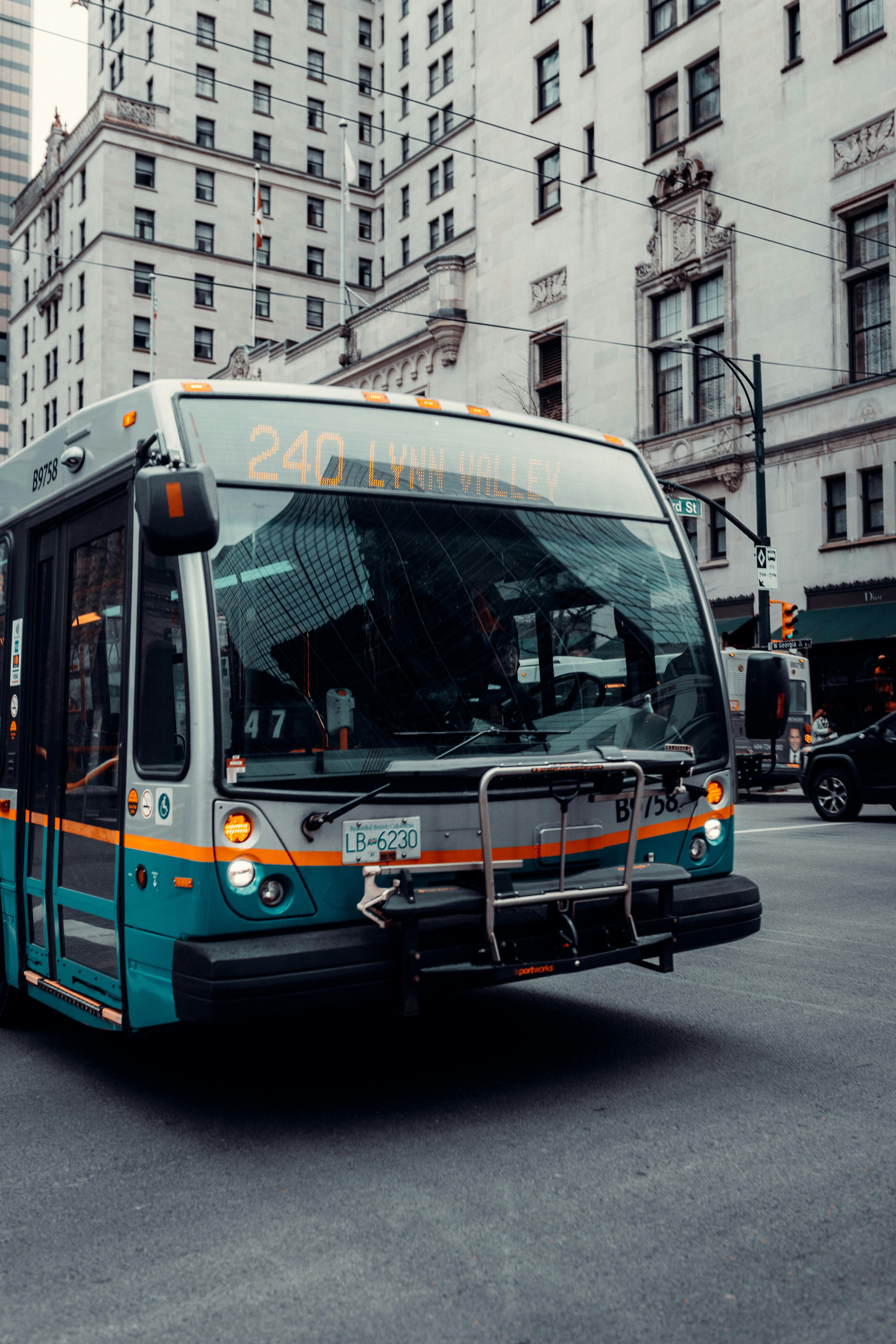 City Bus on Road · Free Stock Photo