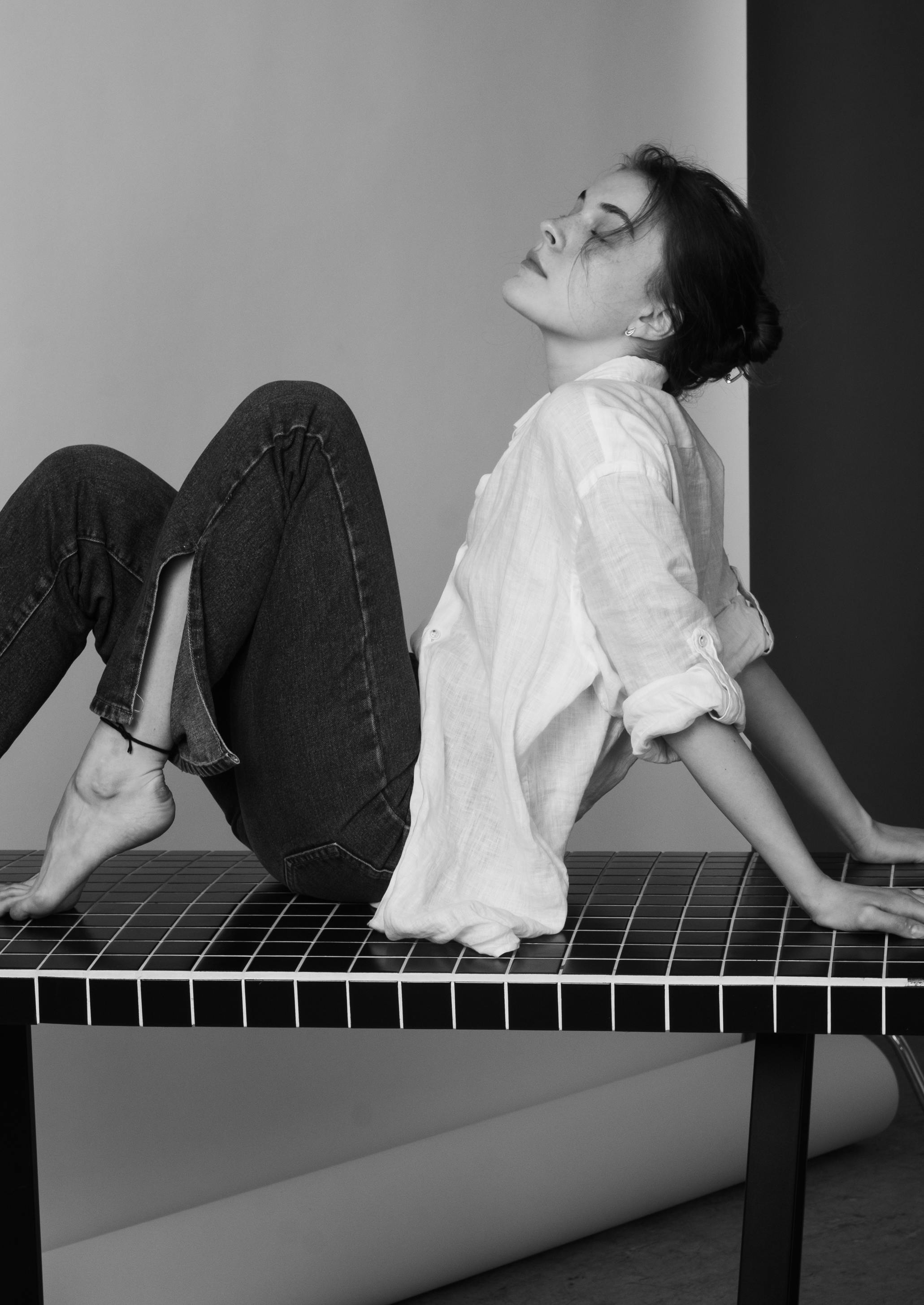 A Woman Sitting on the Table · Free Stock Photo