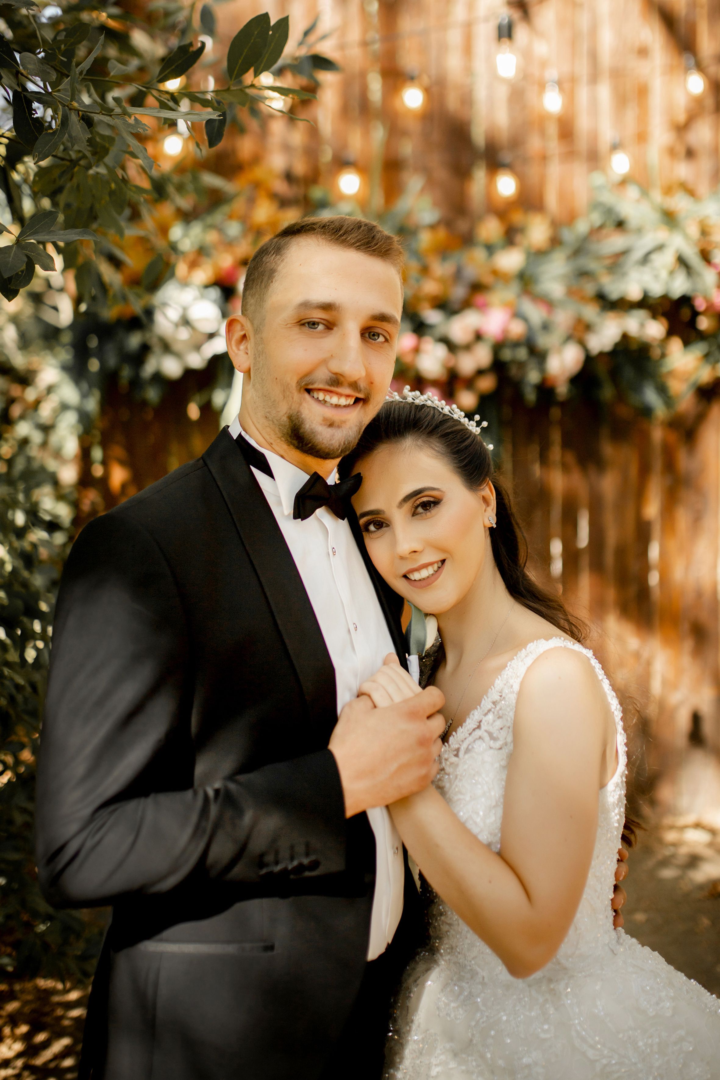 Couple in Wedding Dress and Suit Posing Together · Free Stock Photo