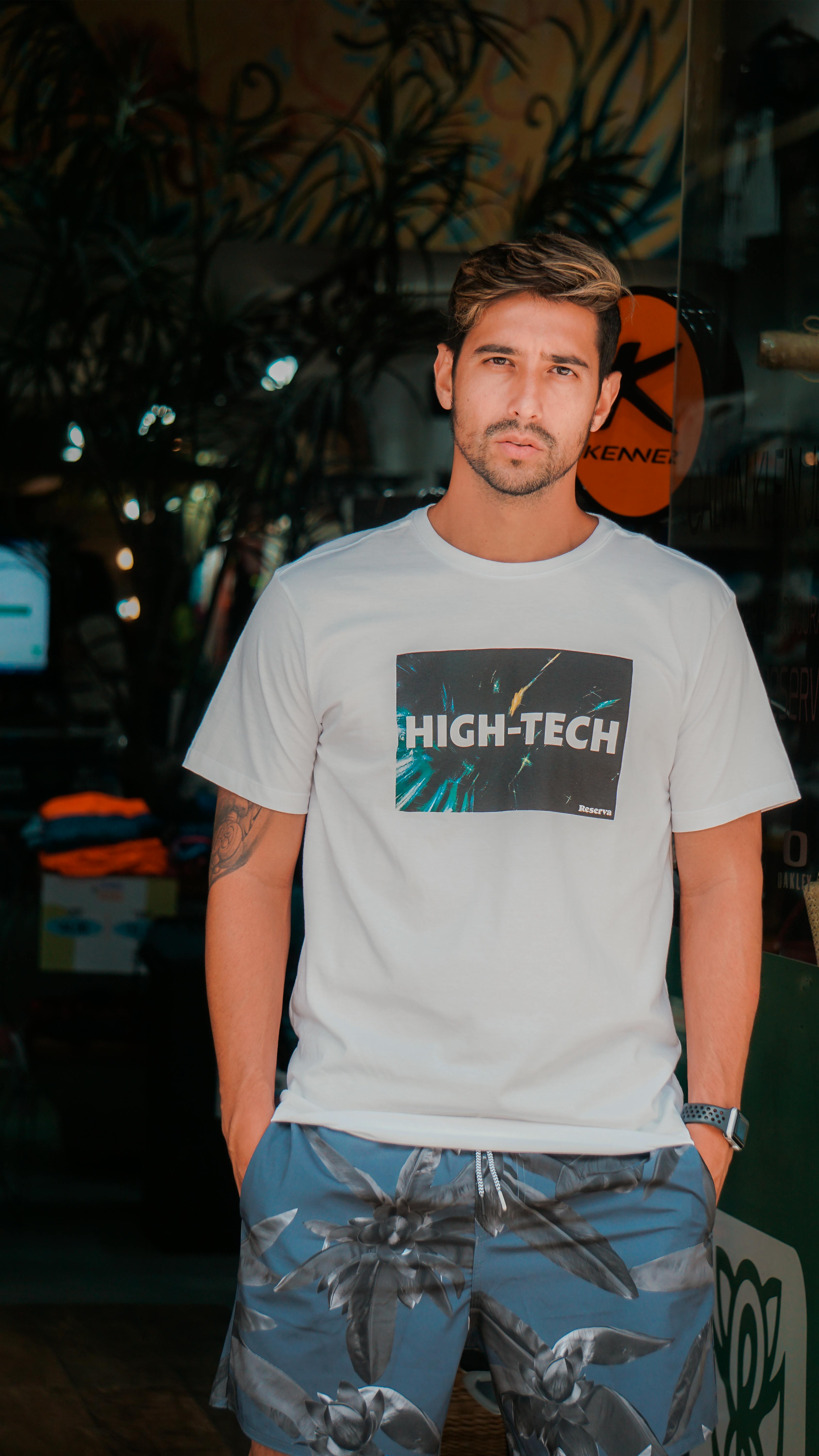 A Good-Looking Man in White Shirt Standing · Free Stock Photo