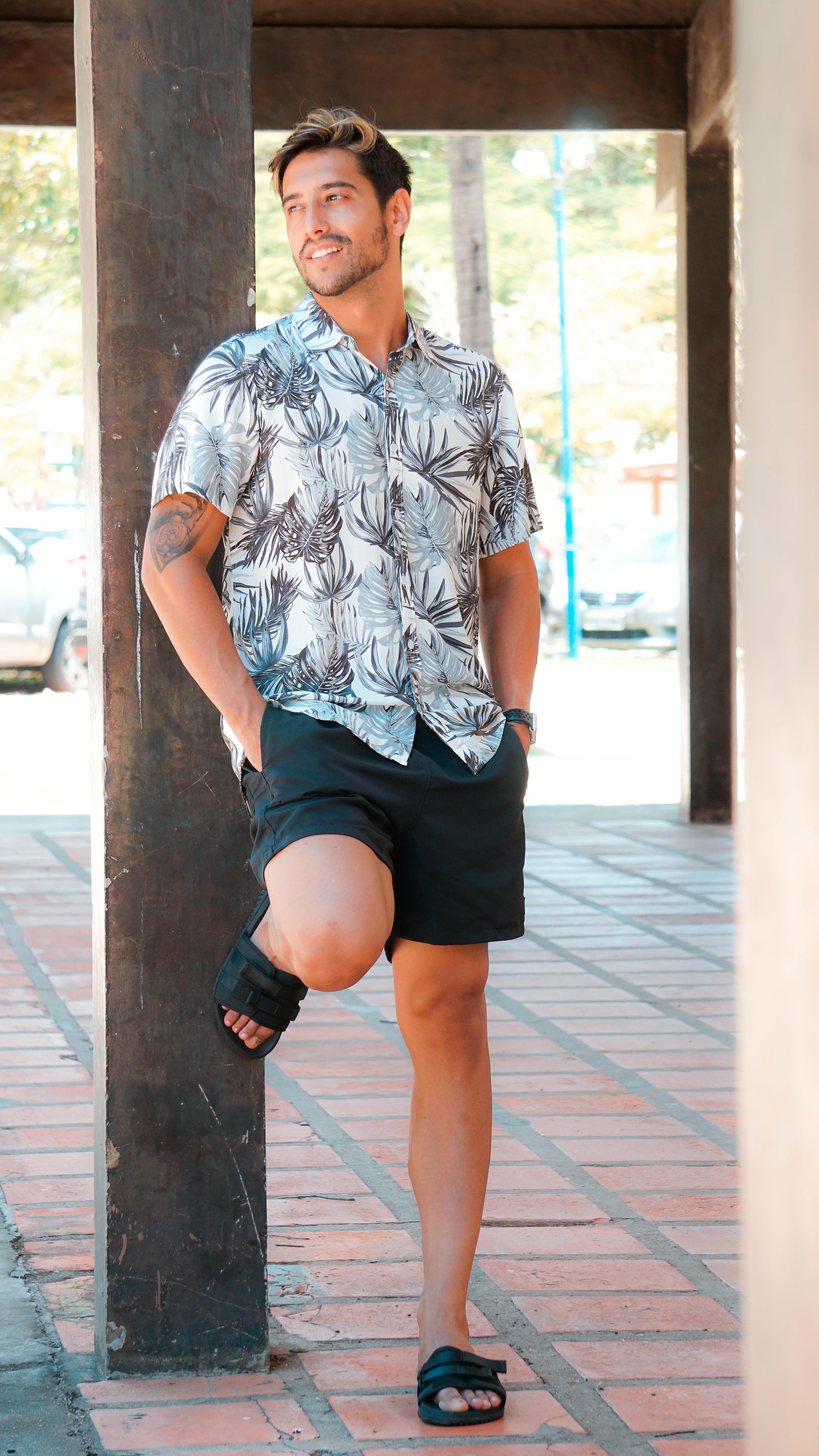 A Man Leaning on the Post · Free Stock Photo