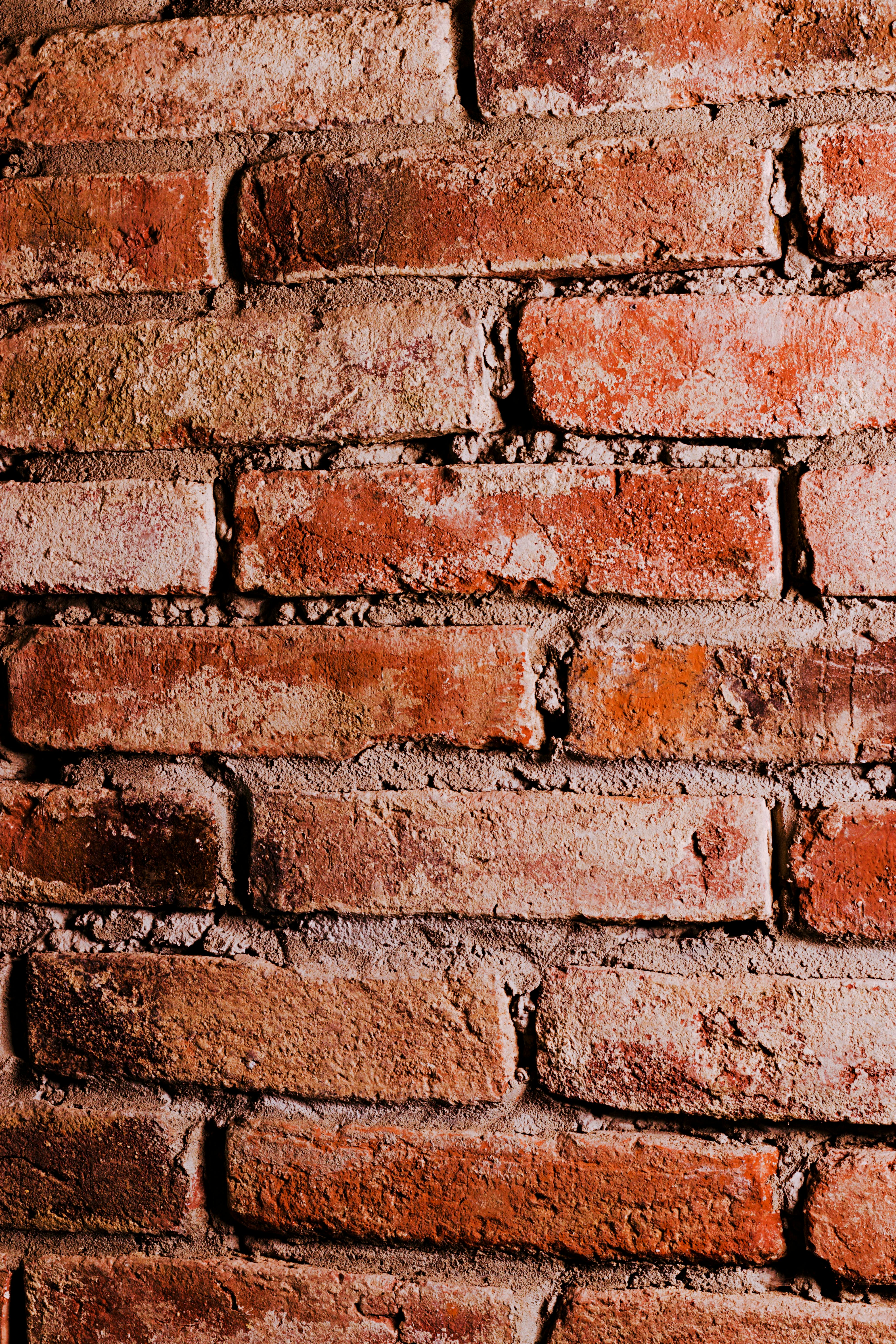 A Close-Up Shot of Red Bricks · Free Stock Photo