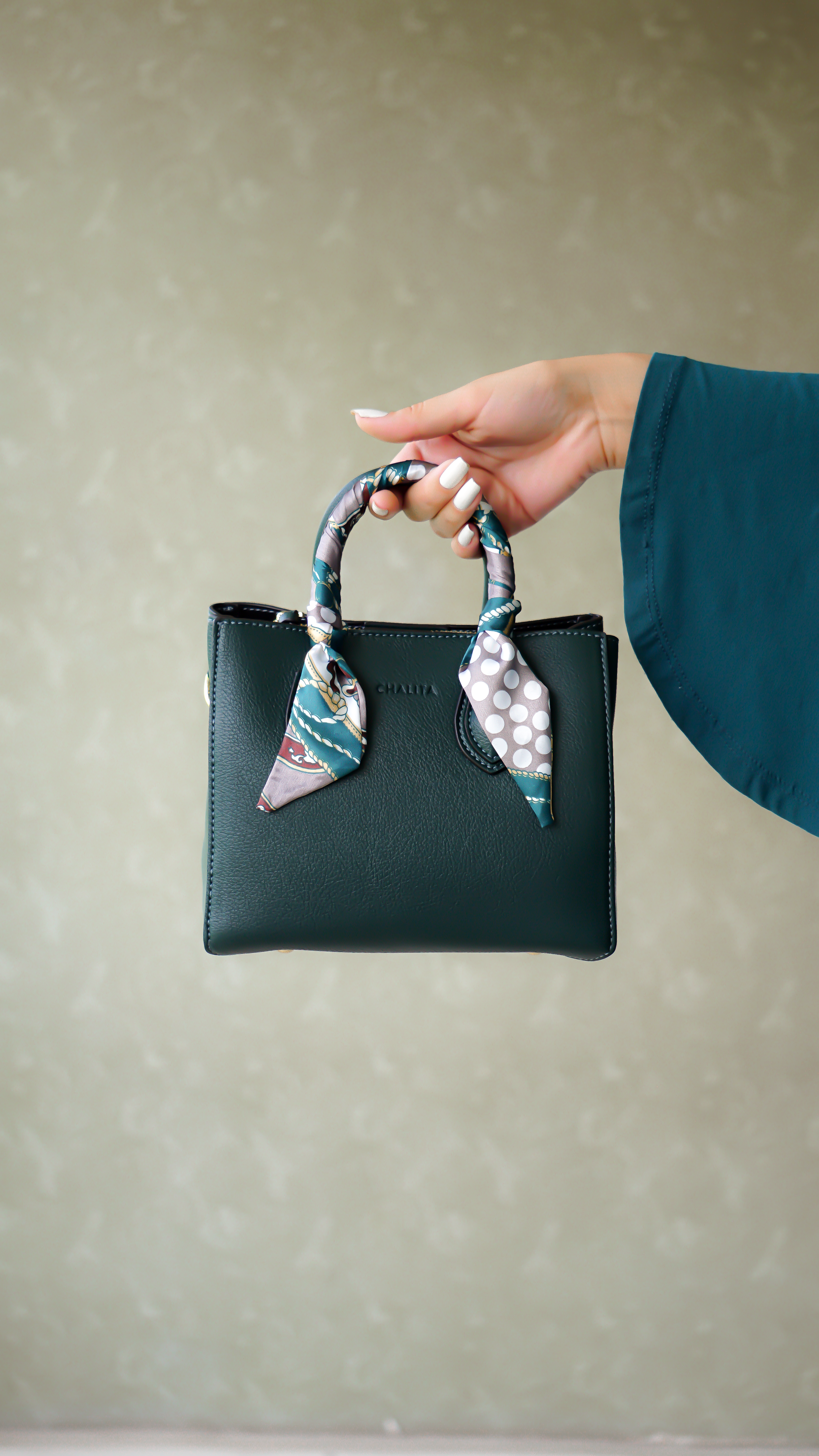 A Person Holding a Black Handbag · Free Stock Photo