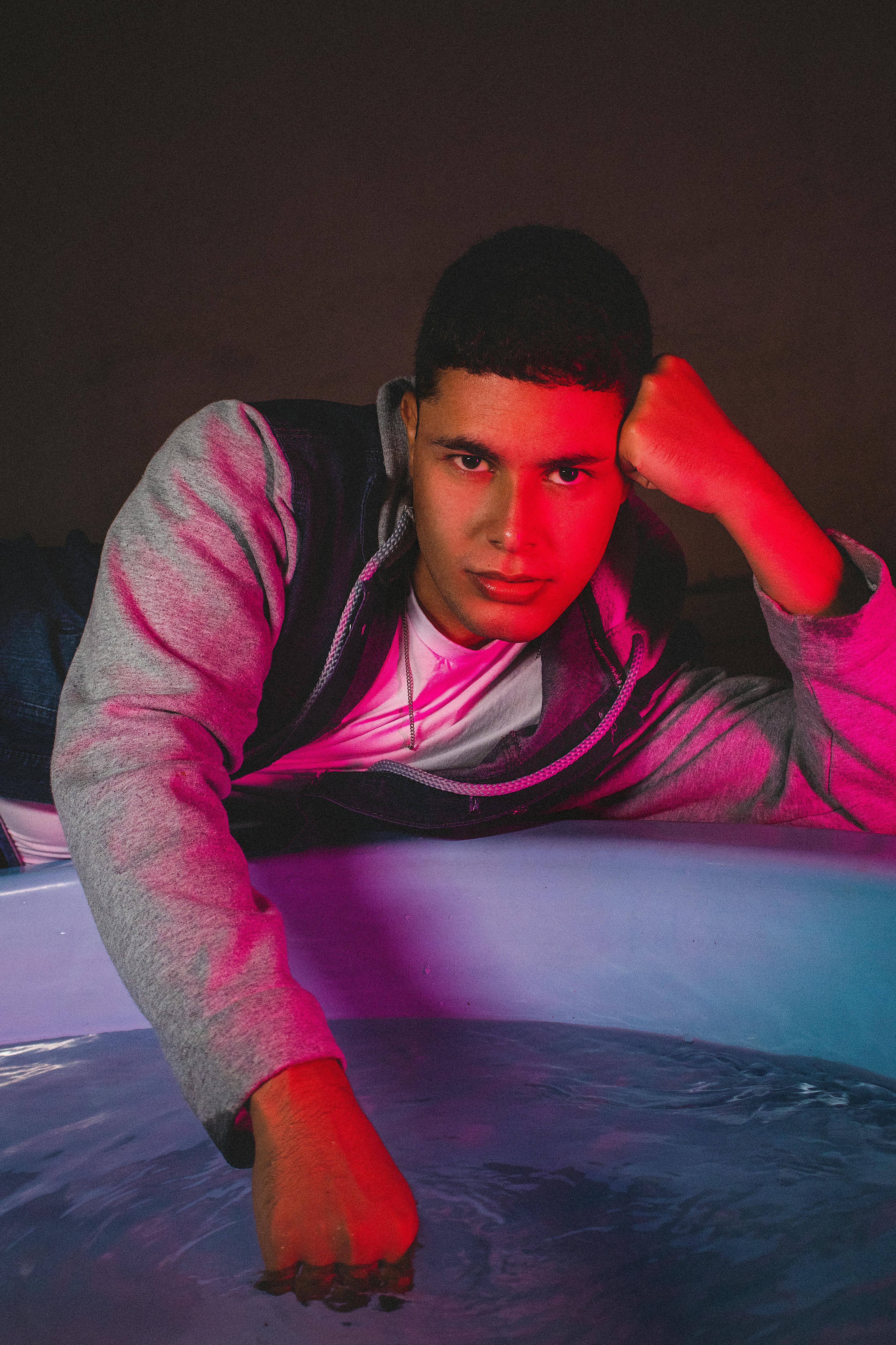 Handsome Man in Pink Light · Free Stock Photo