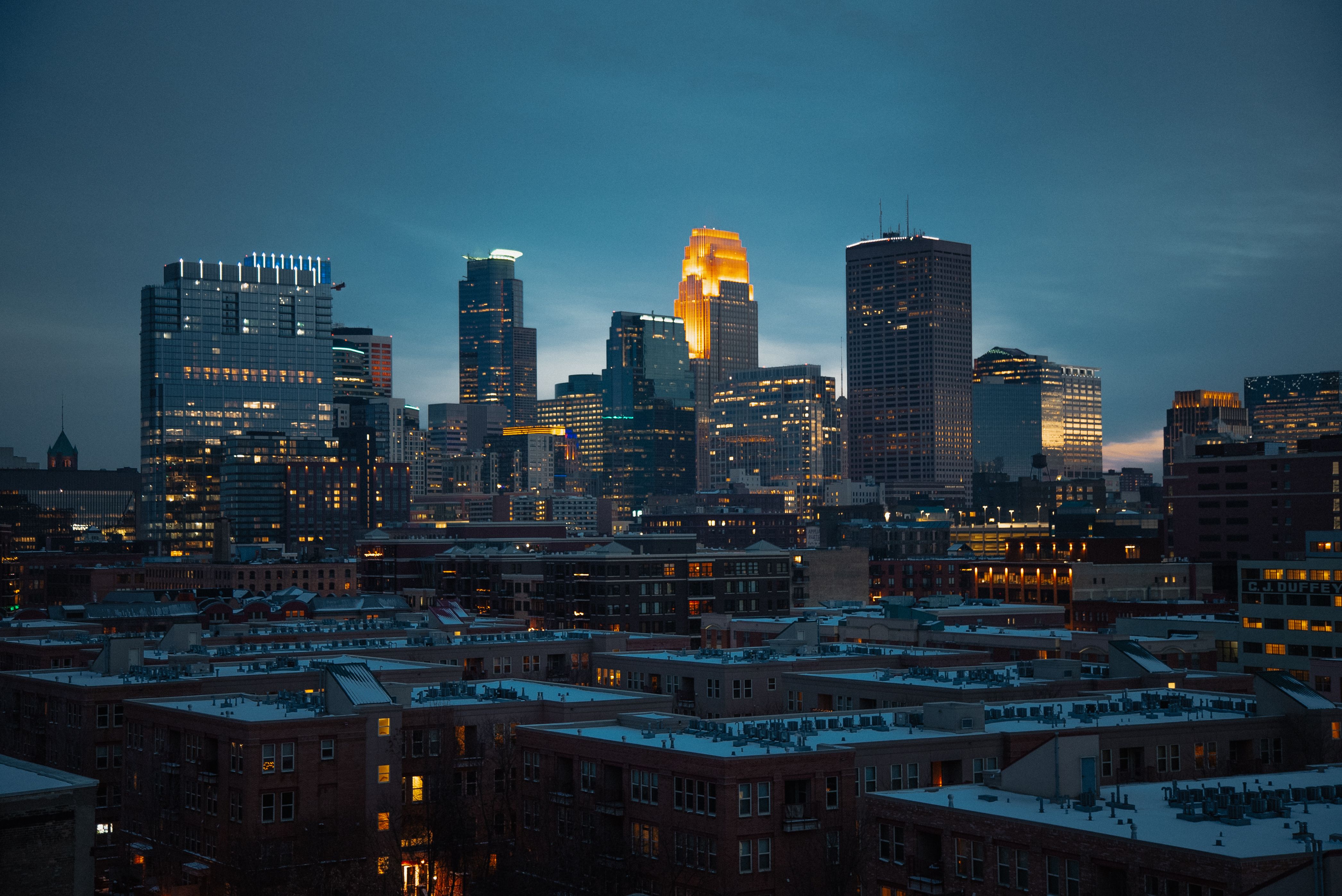 Photo Of City Skyline During Evening · Free Stock Photo