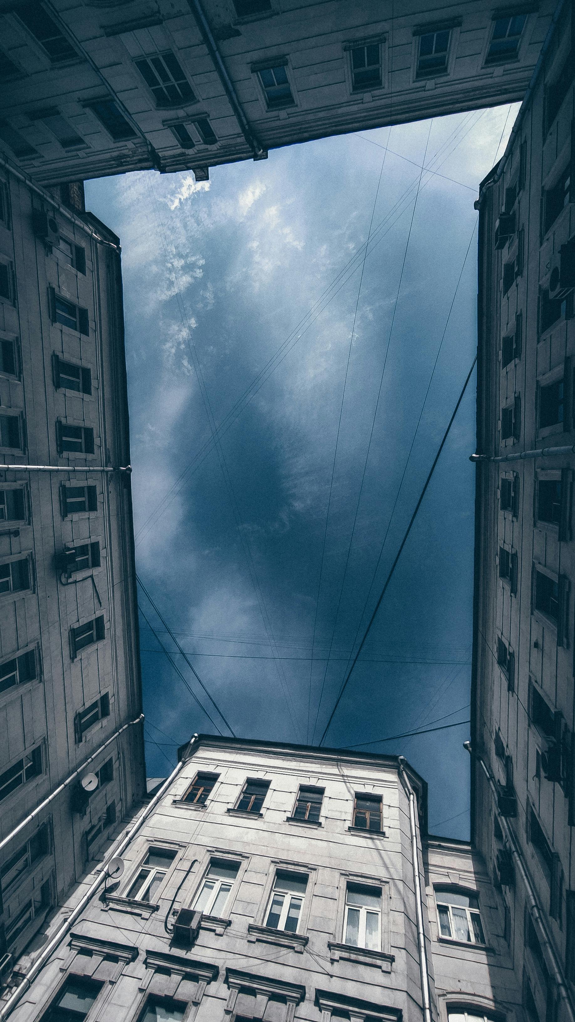 Blue Sky over Buildings · Free Stock Photo