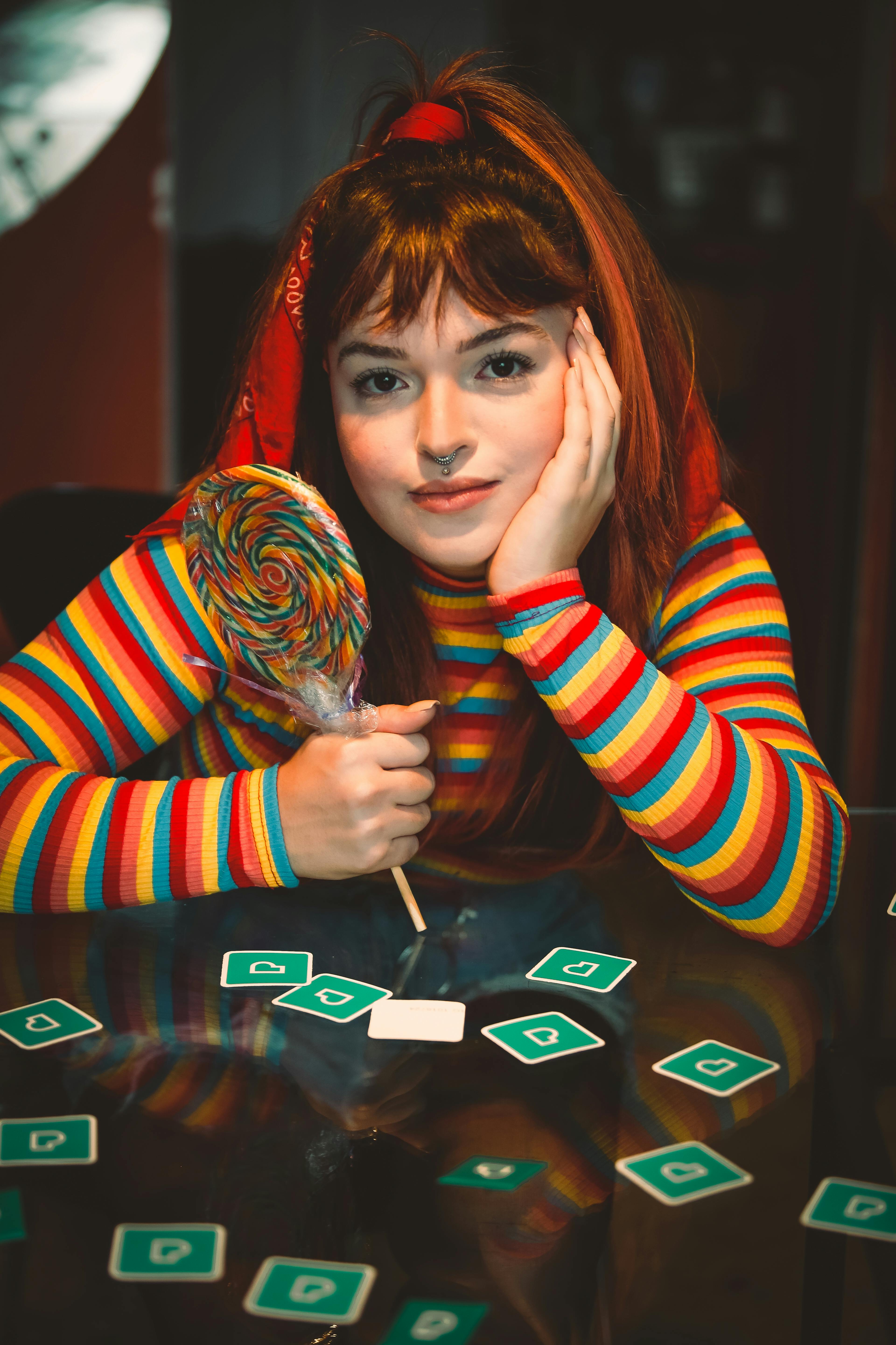 Unknown Person Holding Lollipop · Free Stock Photo