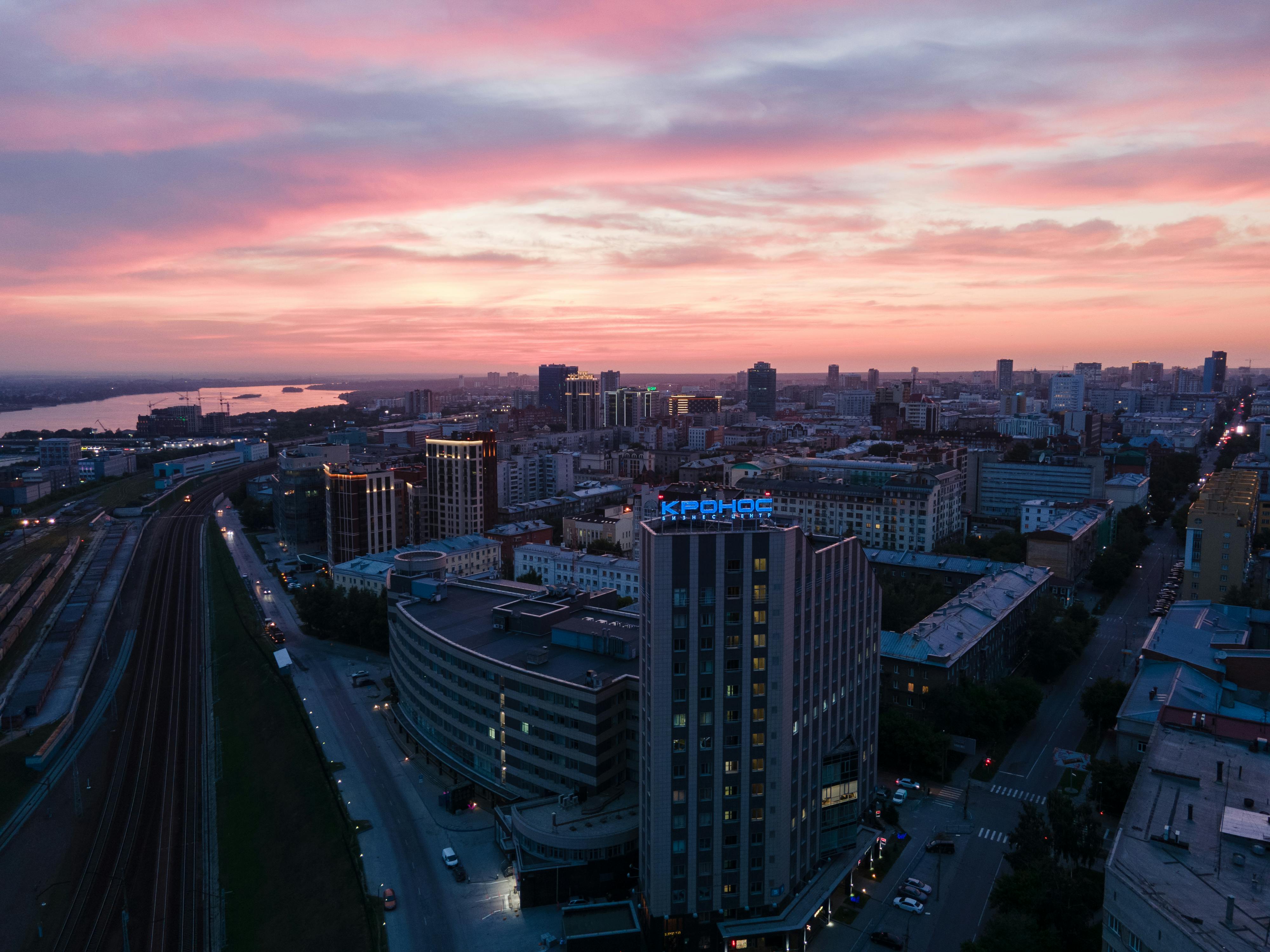 Drone Shot of a City during Sunset · Free Stock Photo