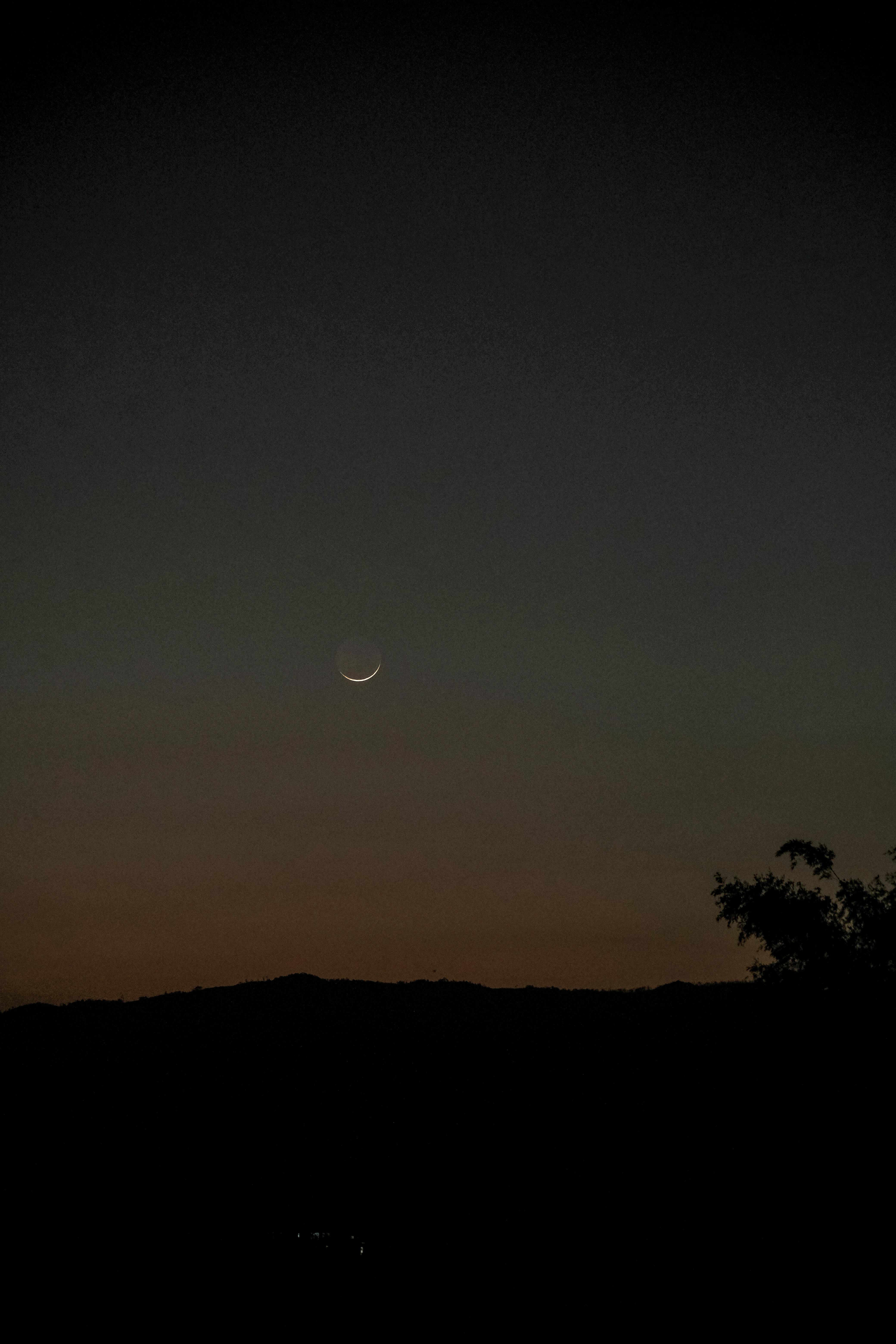 A Crescent Moon during Sunset · Free Stock Photo