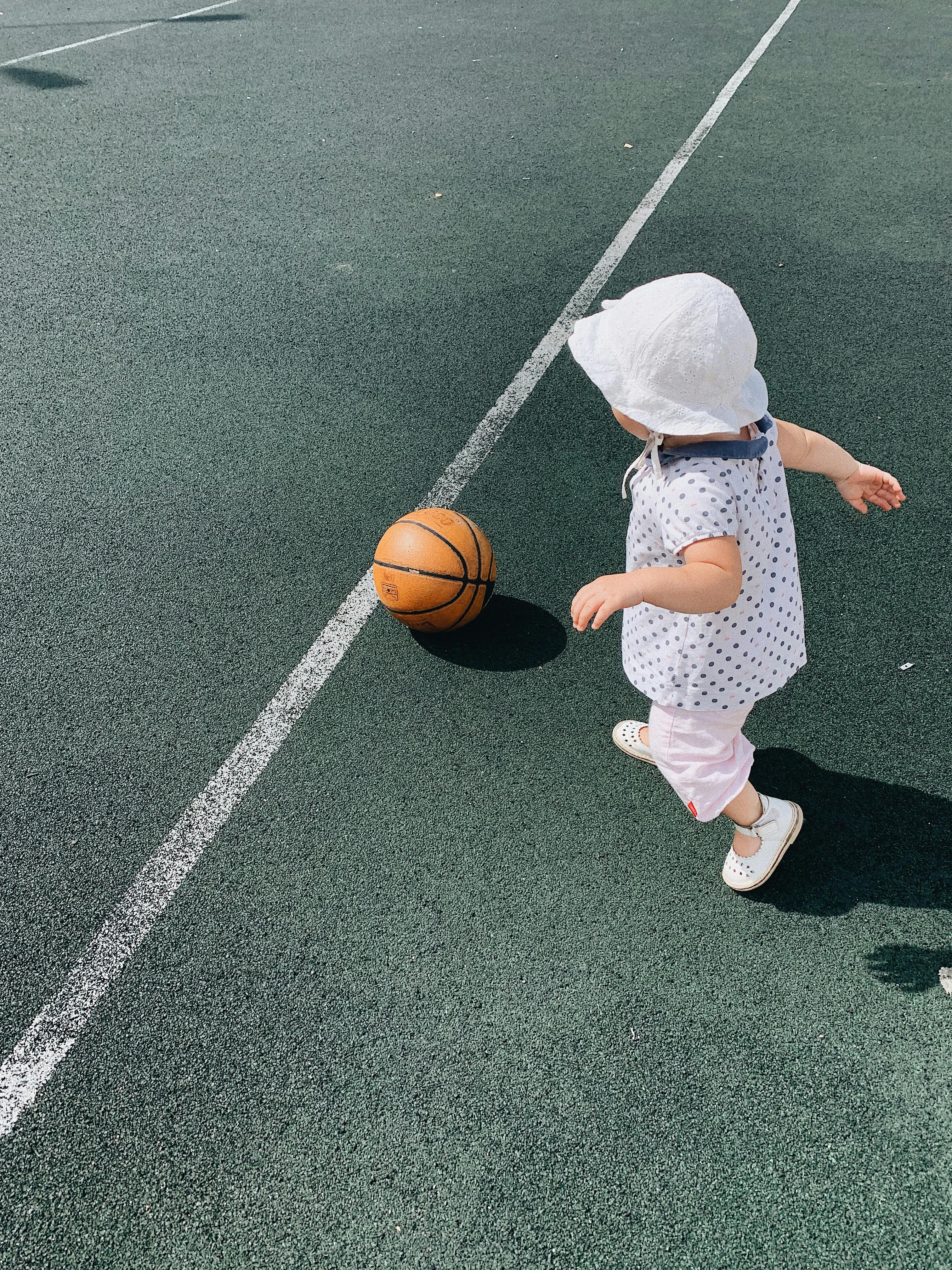 A Child Looking the Ball · Free Stock Photo