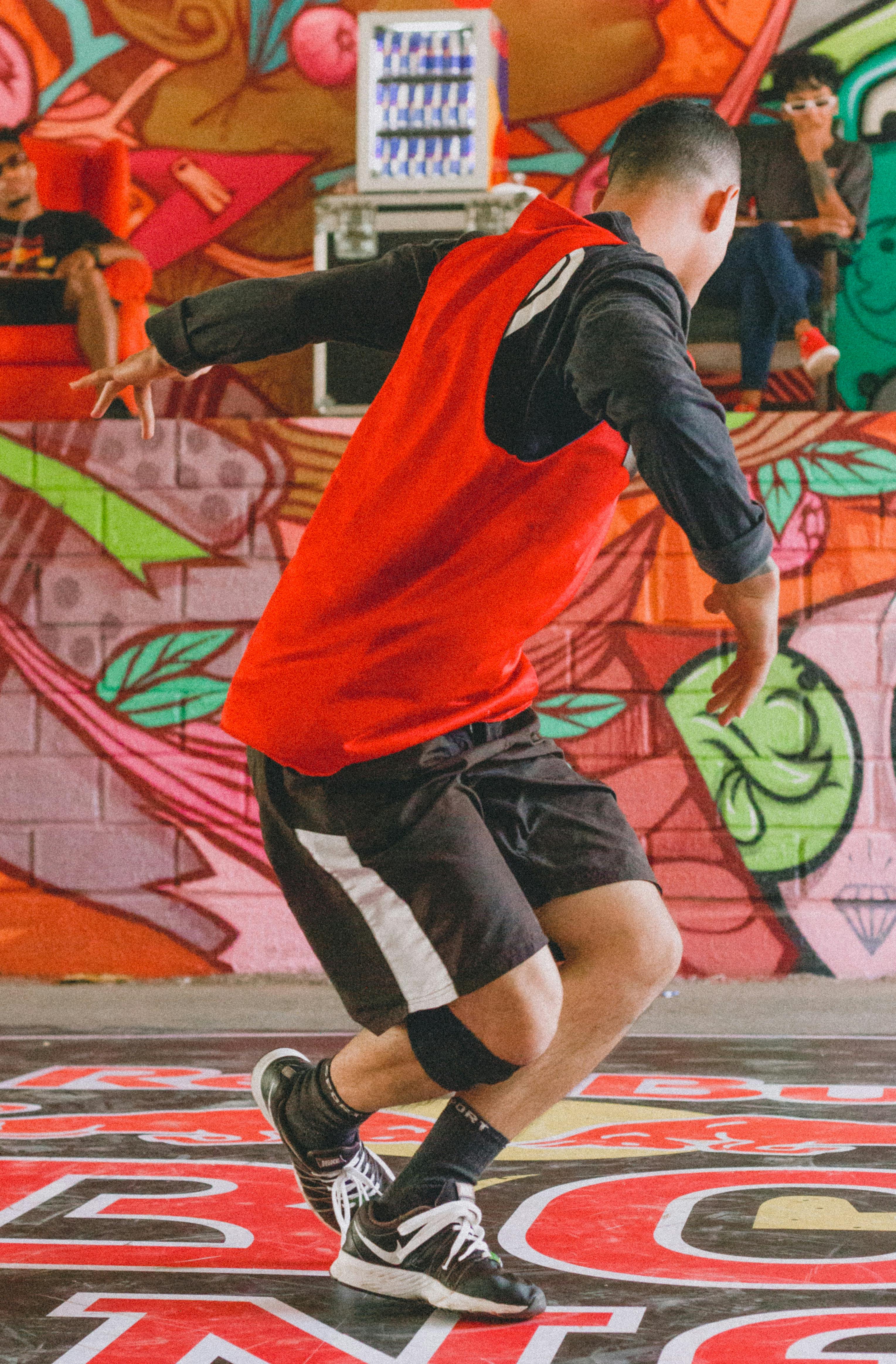 Man Street Dancing near Mural · Free Stock Photo