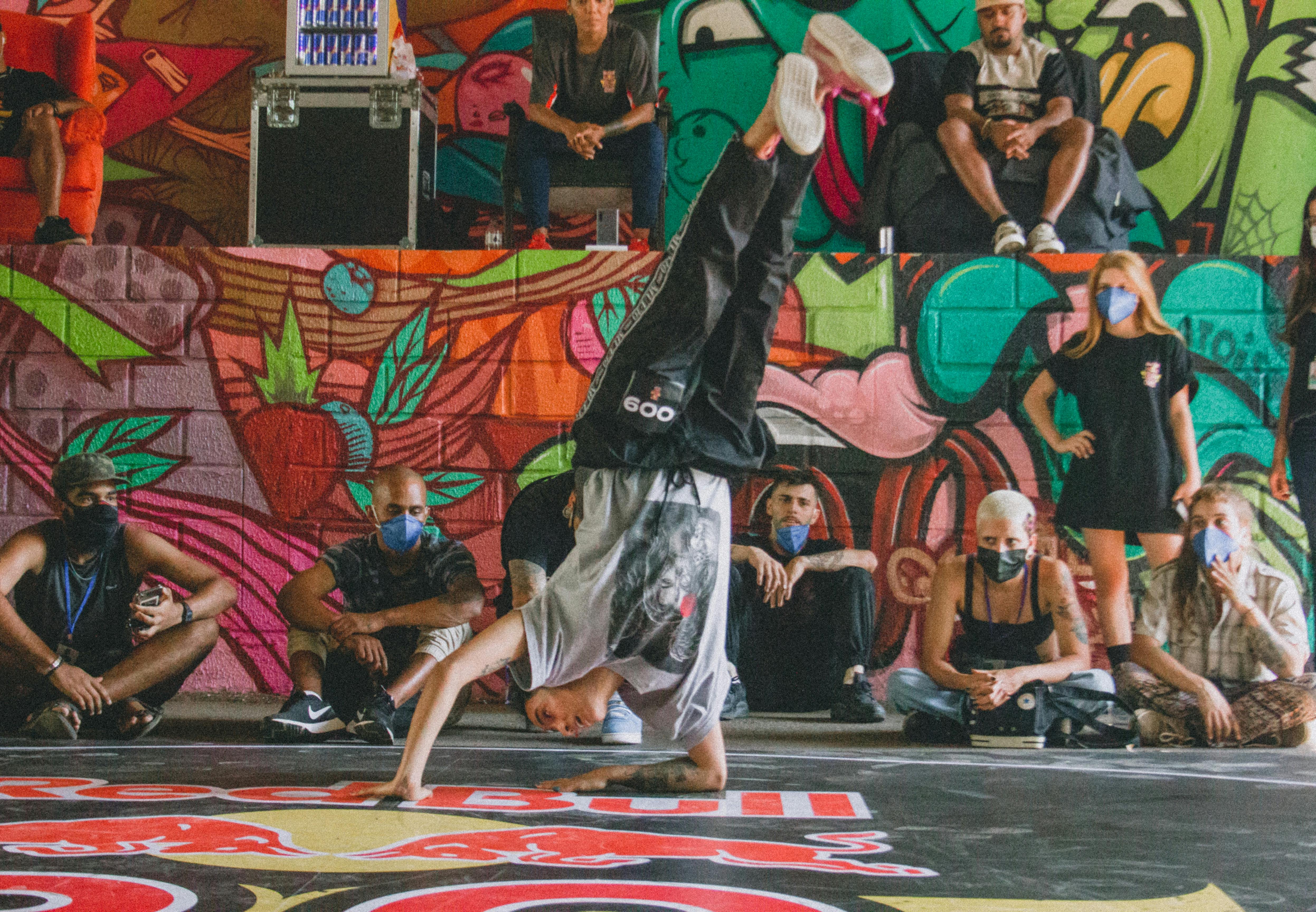 Man Dancing Break Dance in a Circle · Free Stock Photo