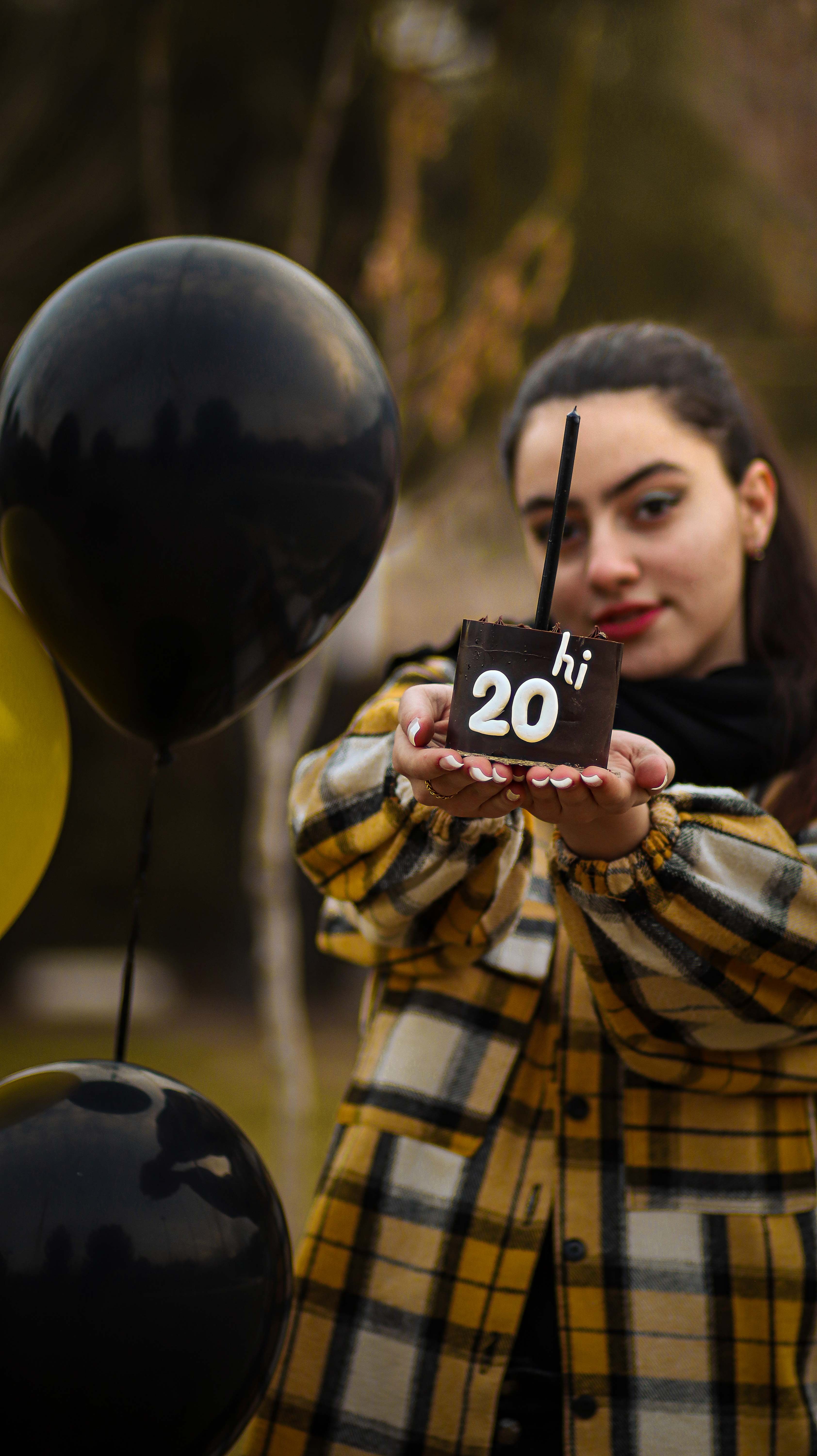 Beautiful Woman Showing a Birthday Cake · Free Stock Photo