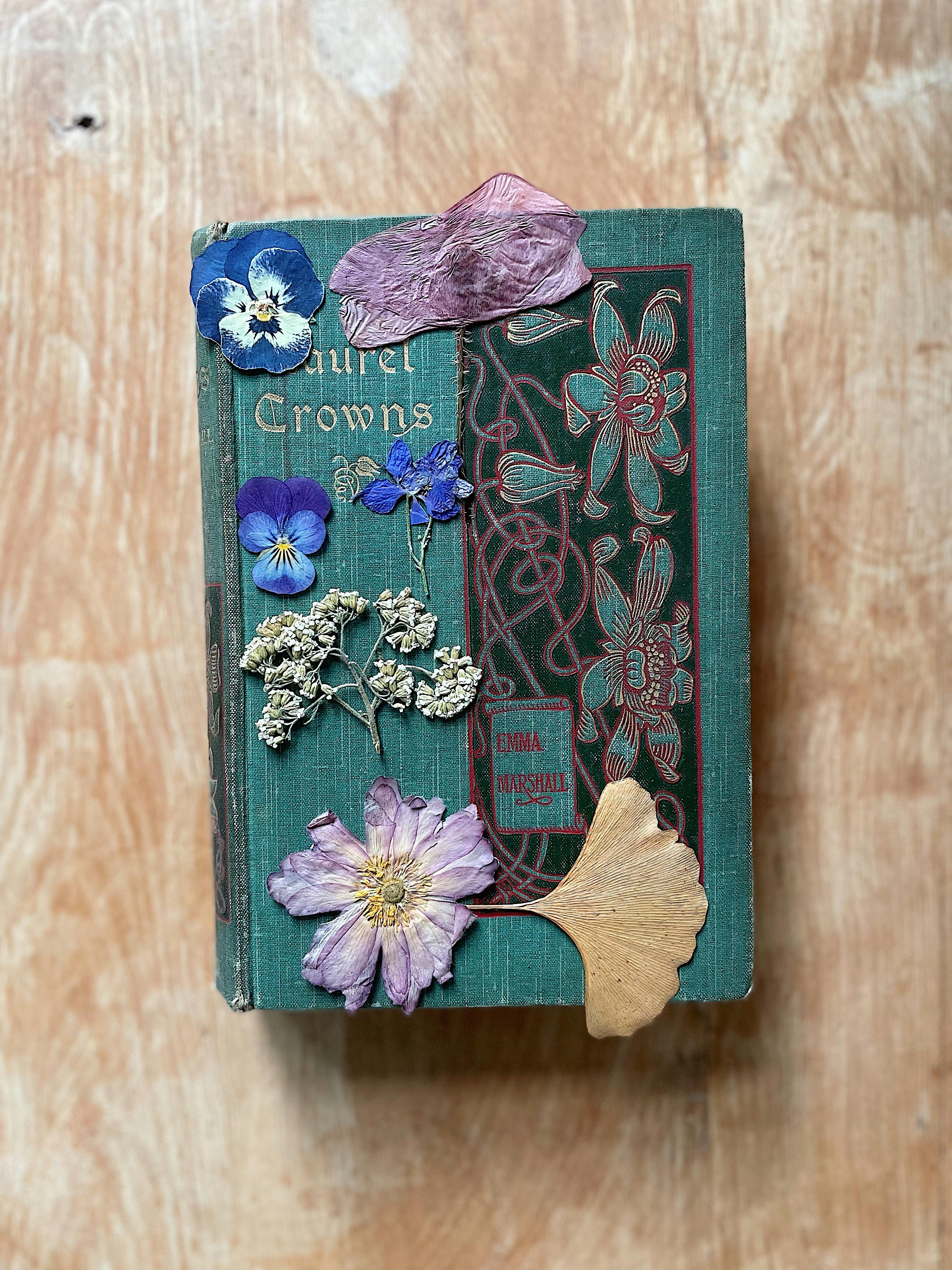 Book Cover Decorated with Flowers · Free Stock Photo