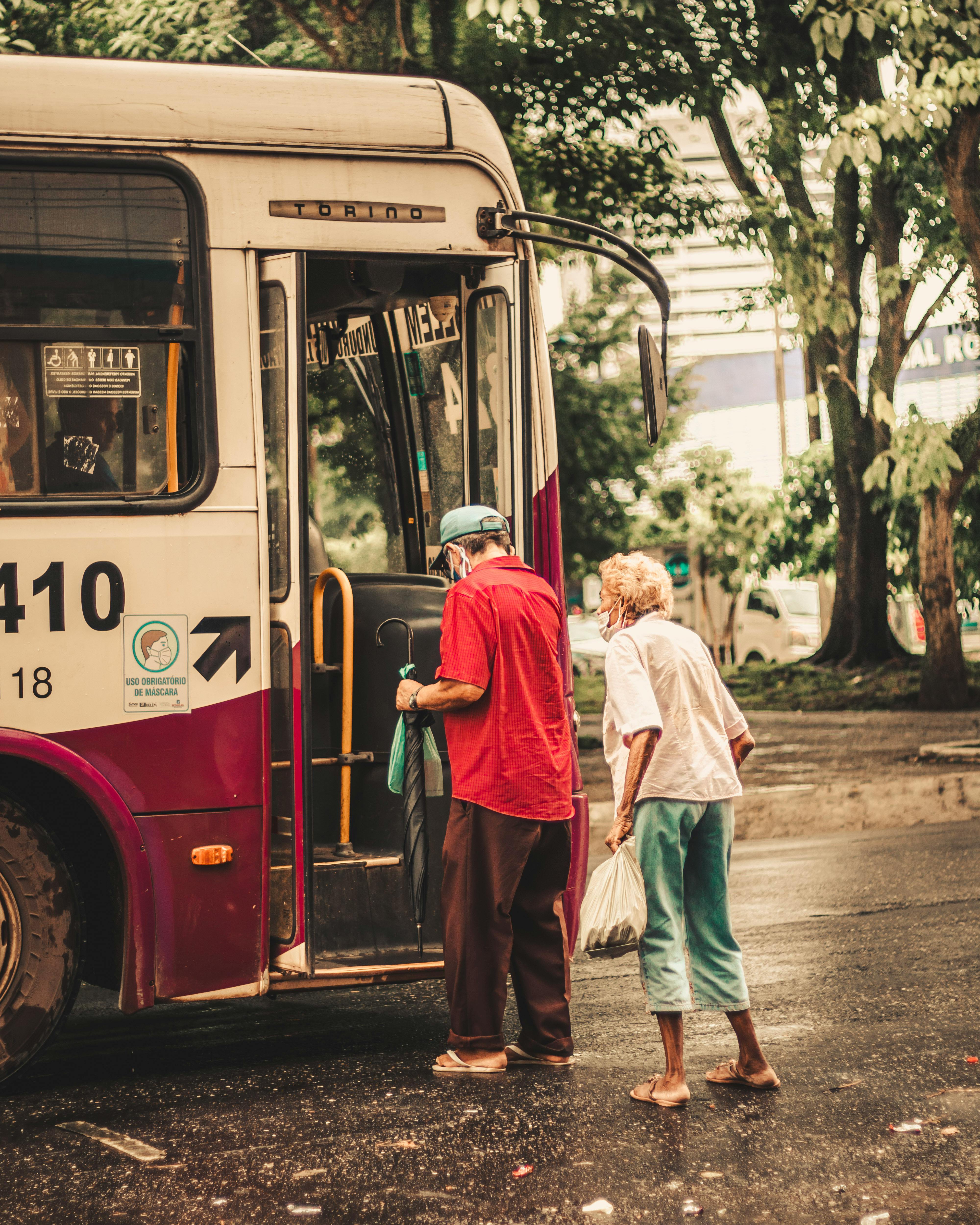 Eldery People Getting on the Bus · Free Stock Photo