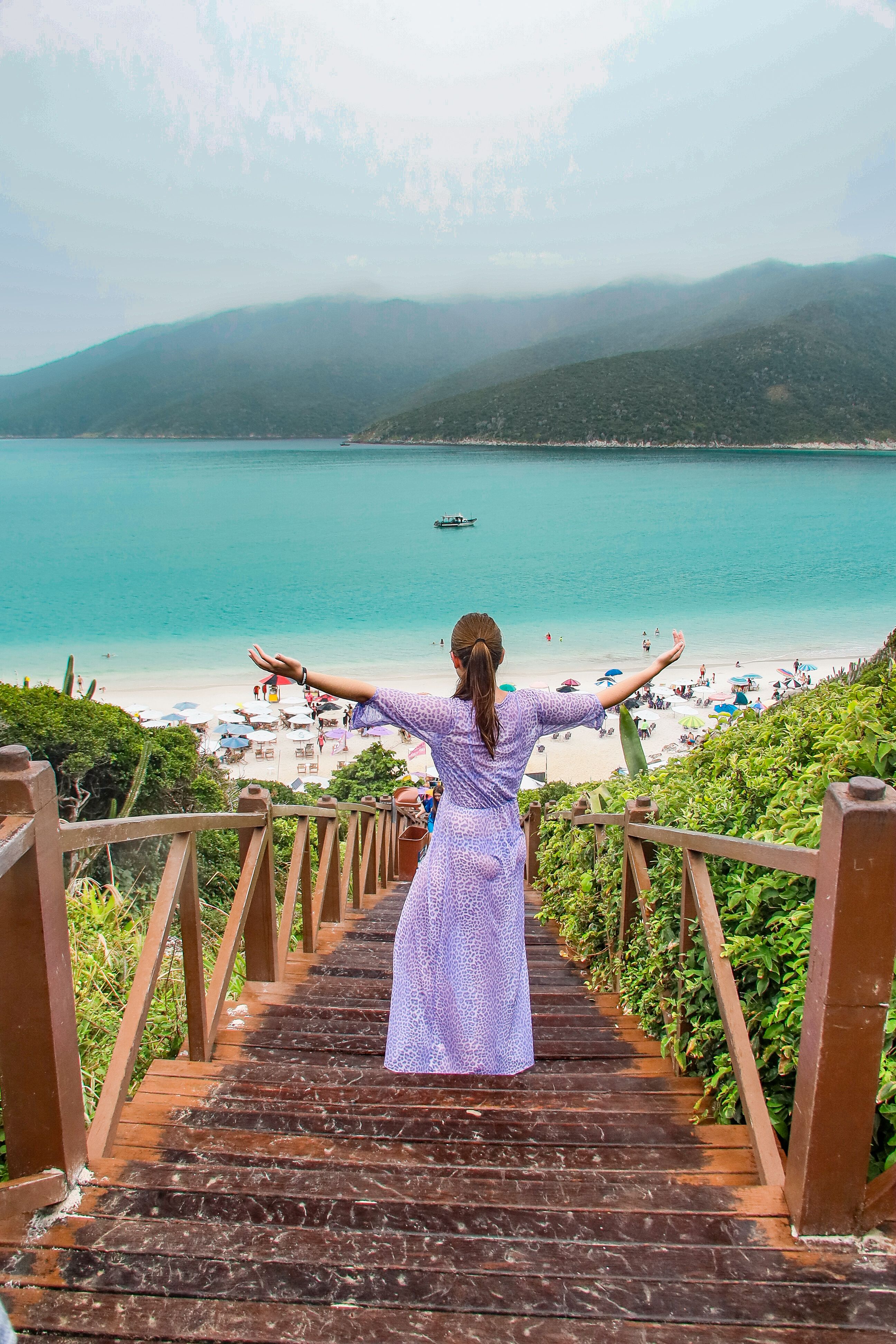 Back View of a Woman Spreading Her Arms · Free Stock Photo