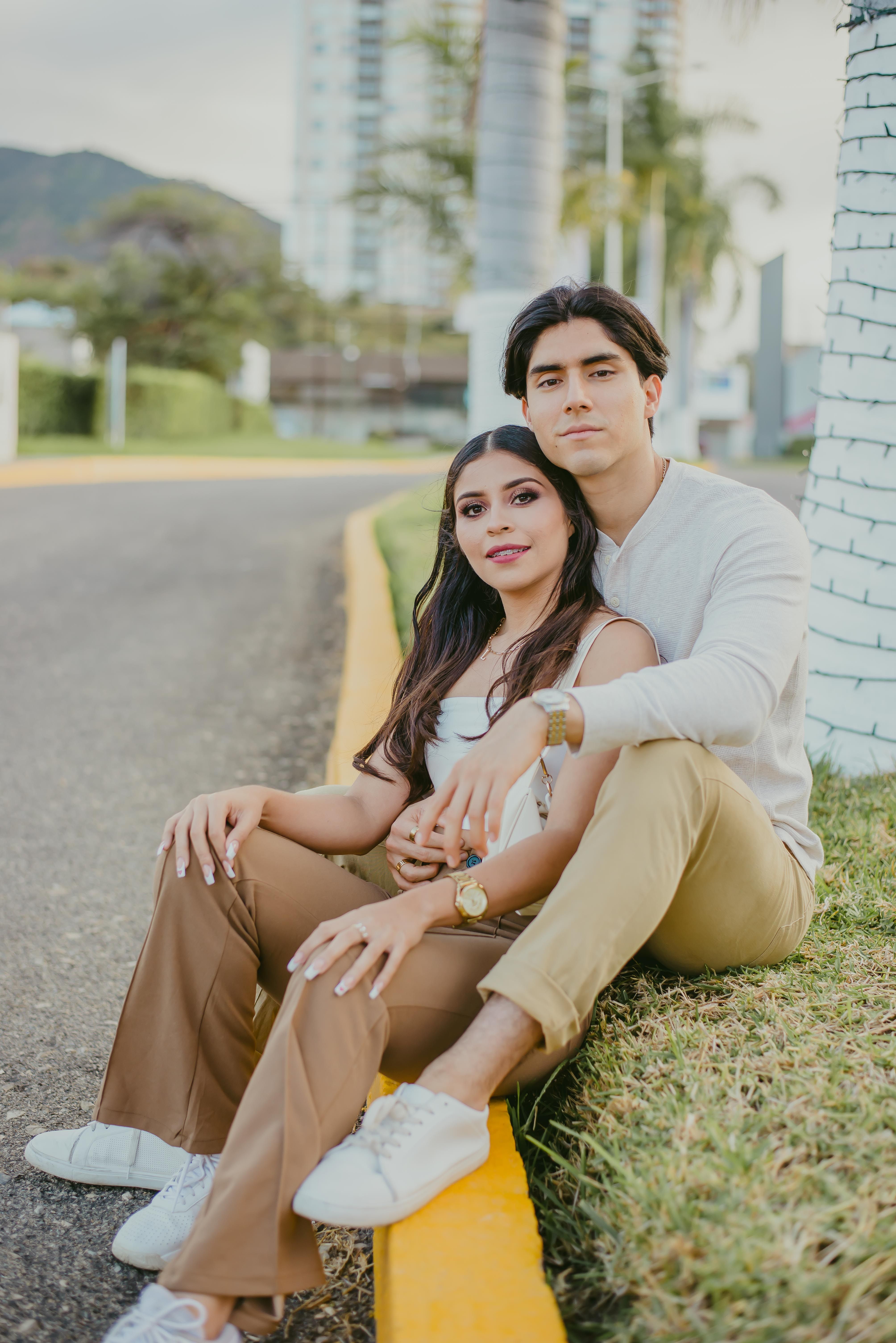 Young Smiling Couple Outdoors · Free Stock Photo