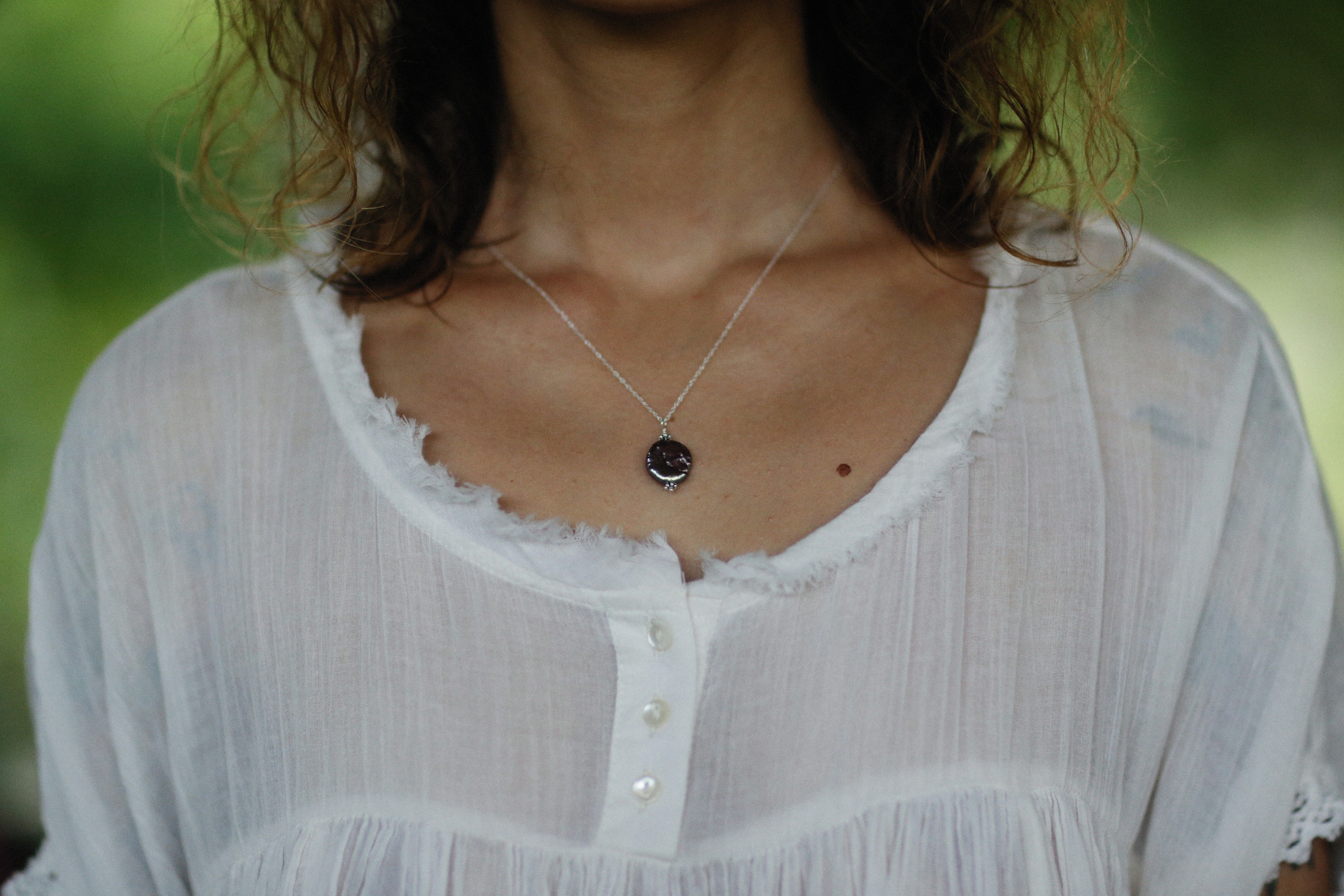 A Person Wearing a Necklace · Free Stock Photo