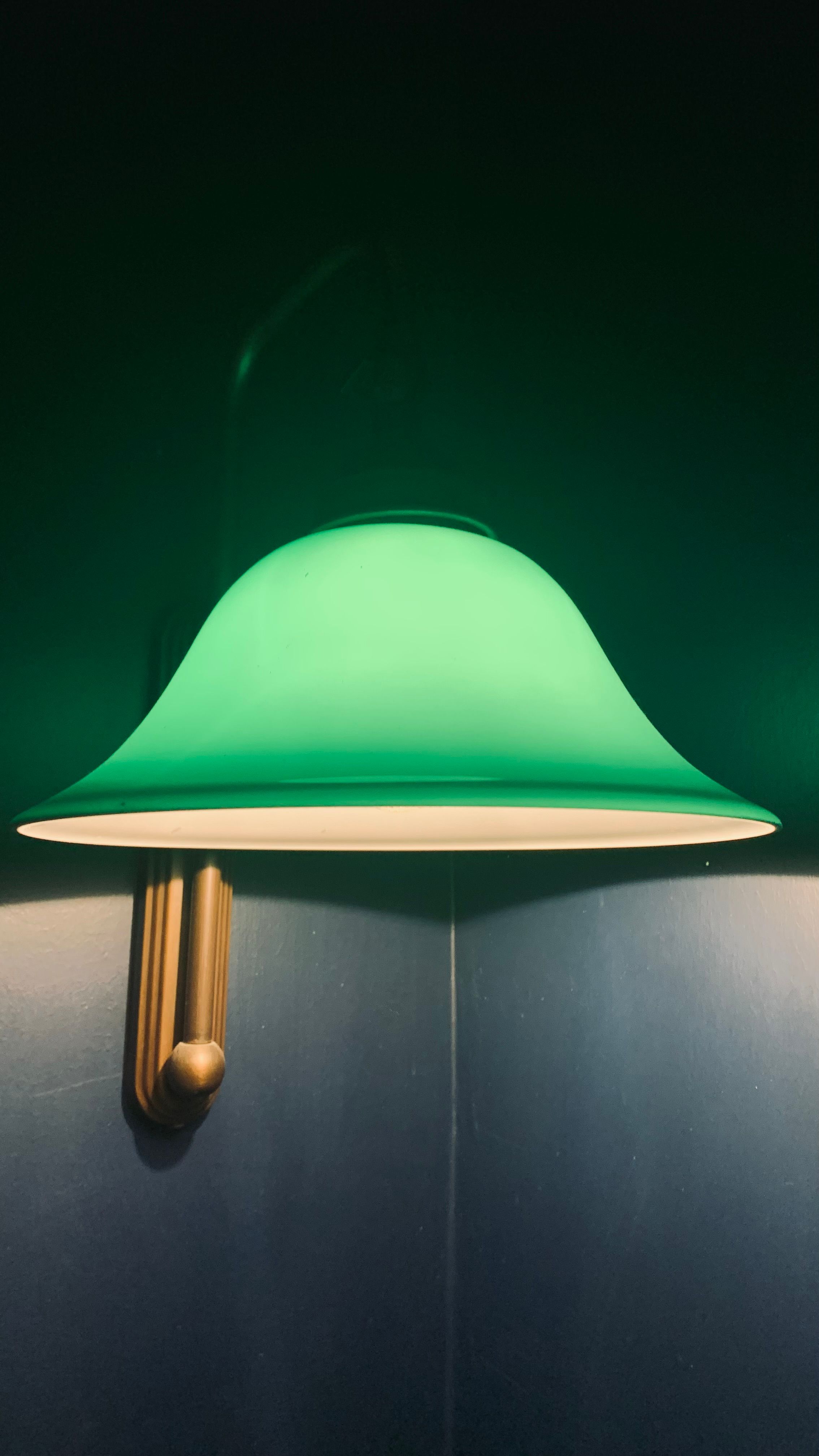 Close-Up Shot of a Lamp Hanging on a Wall · Free Stock Photo