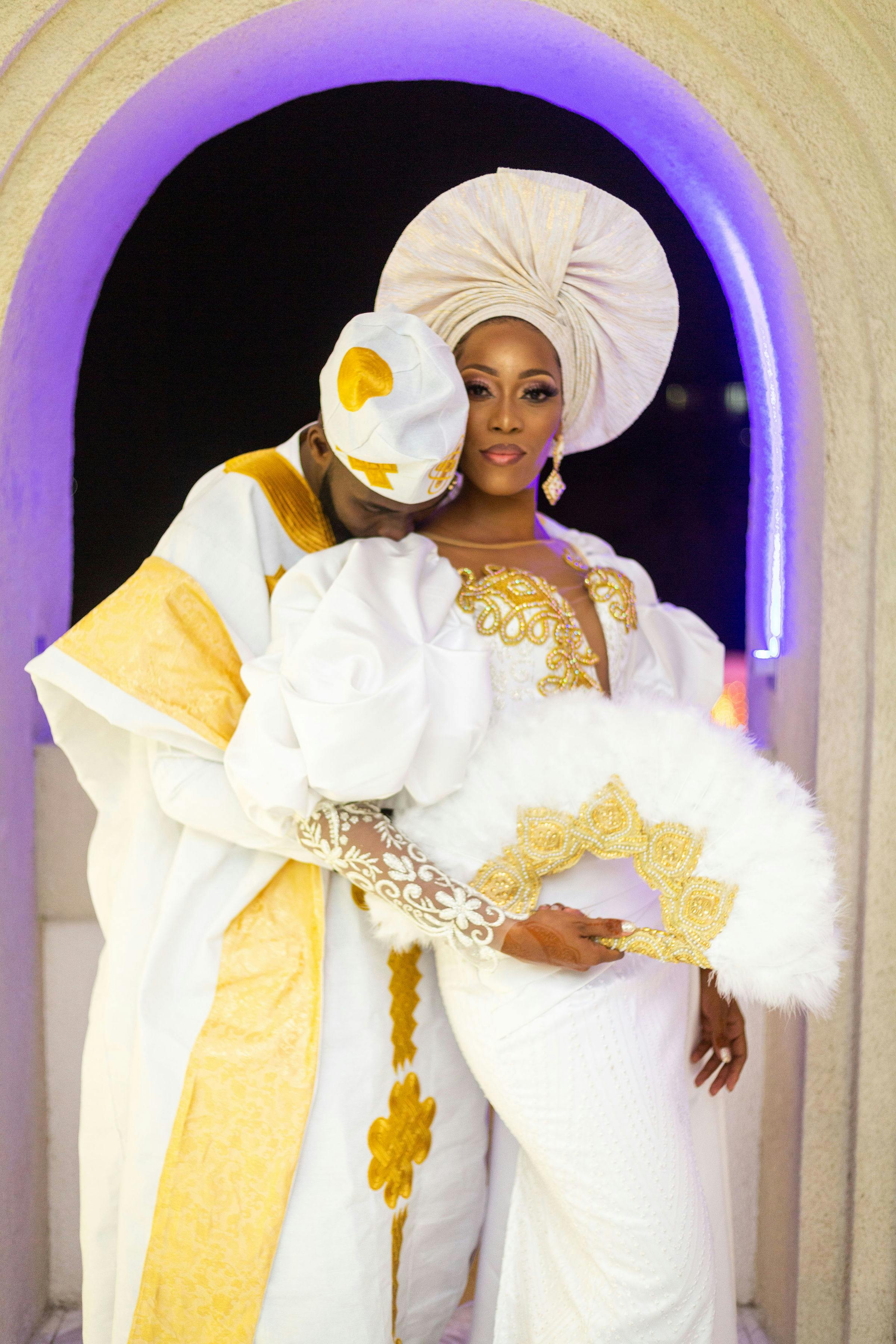 Young Couple in Traditional Clothing Posing Together · Free Stock Photo