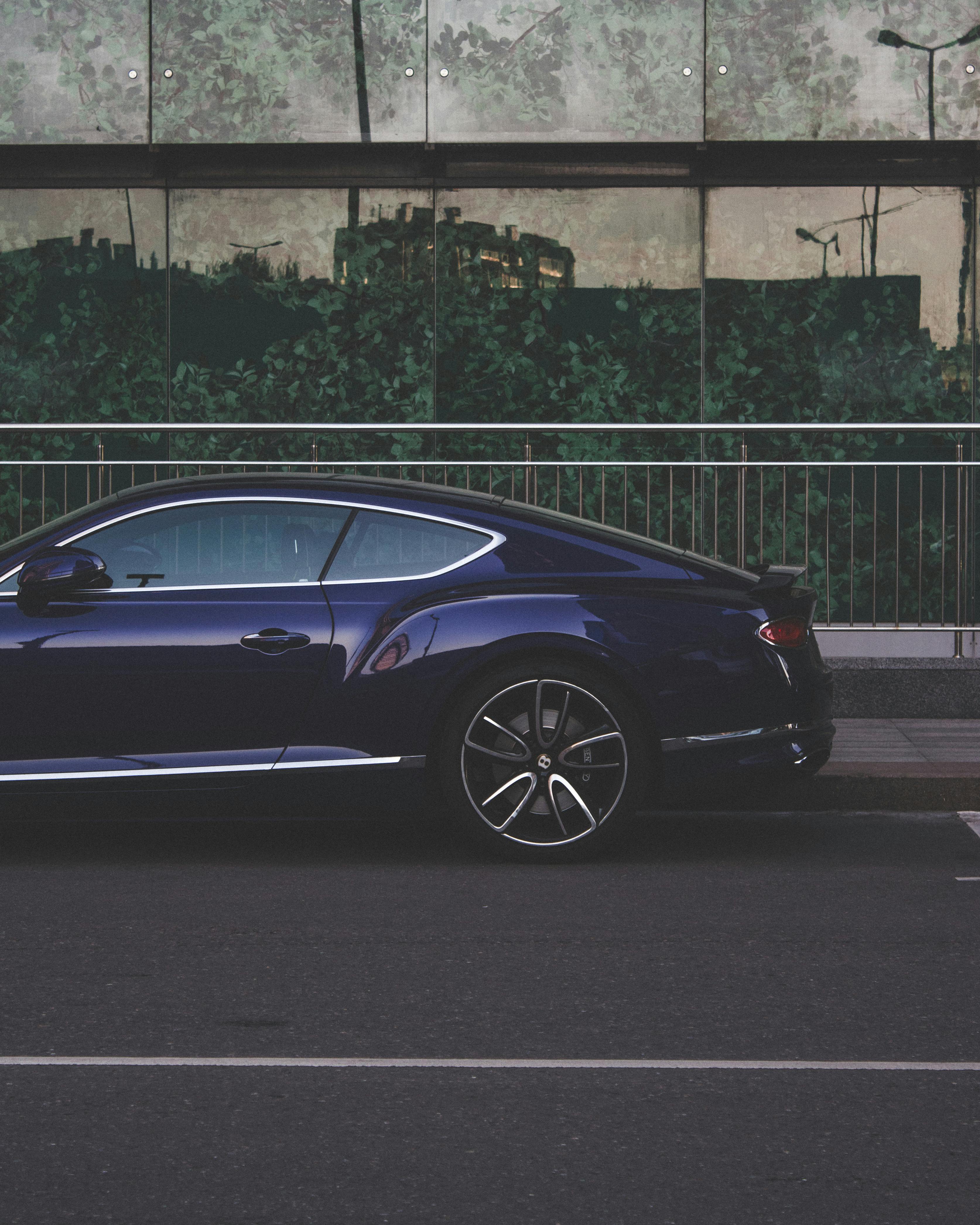 Blue Car Parked on Roadside · Free Stock Photo