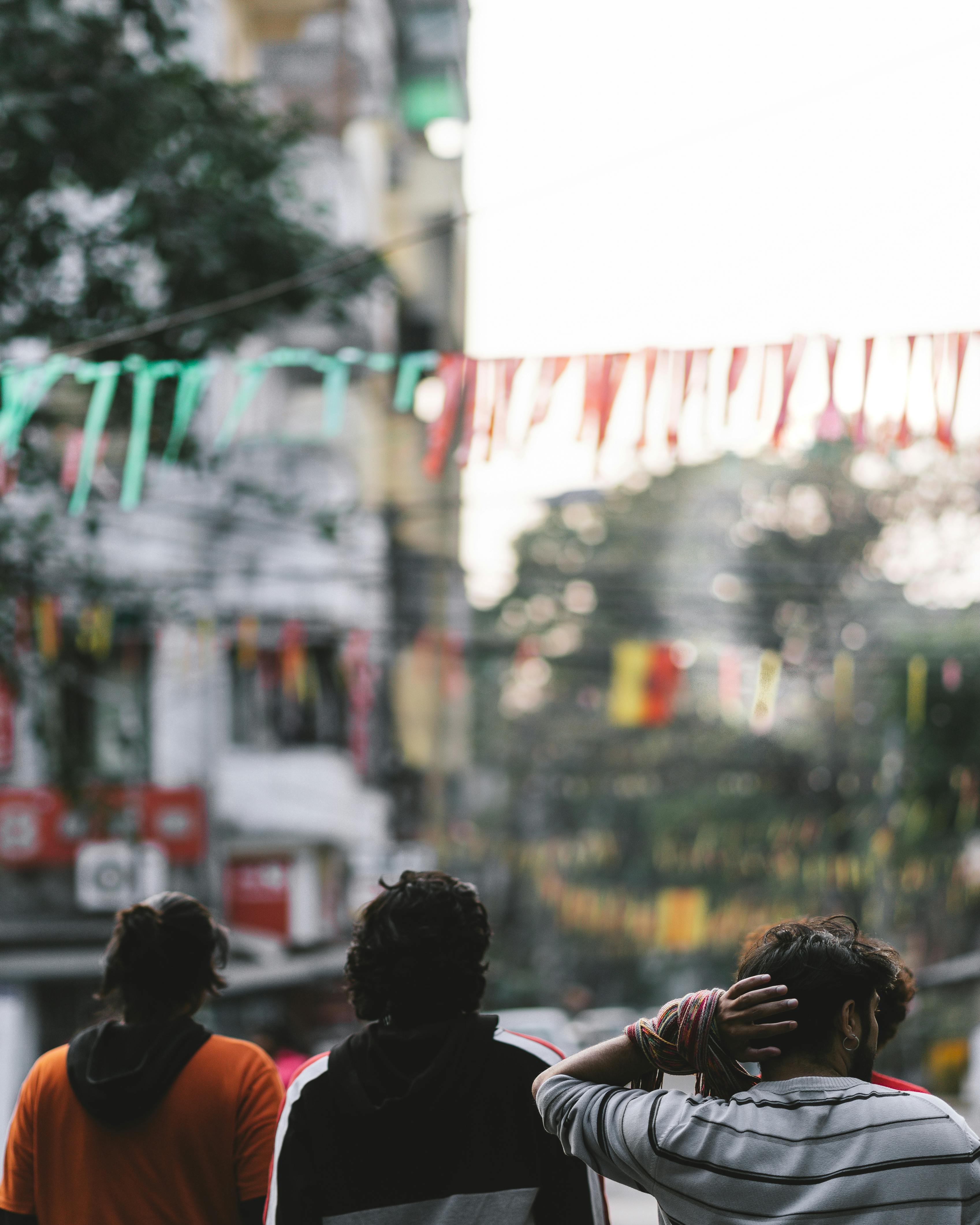 A Two Women Posing Back To Back · Free Stock Photo